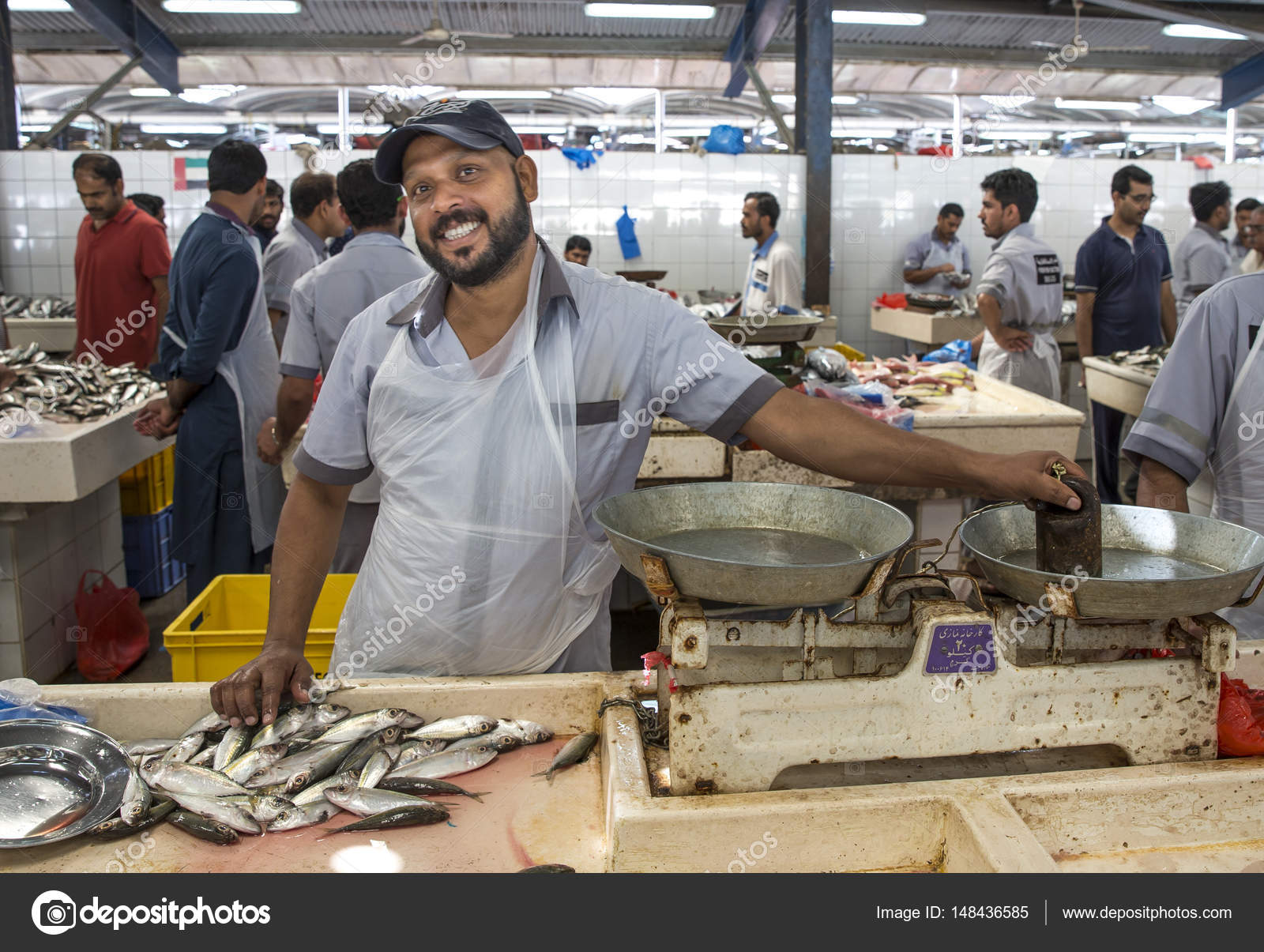 Men selling fish – Stock Editorial Photo © katiekk #148436585