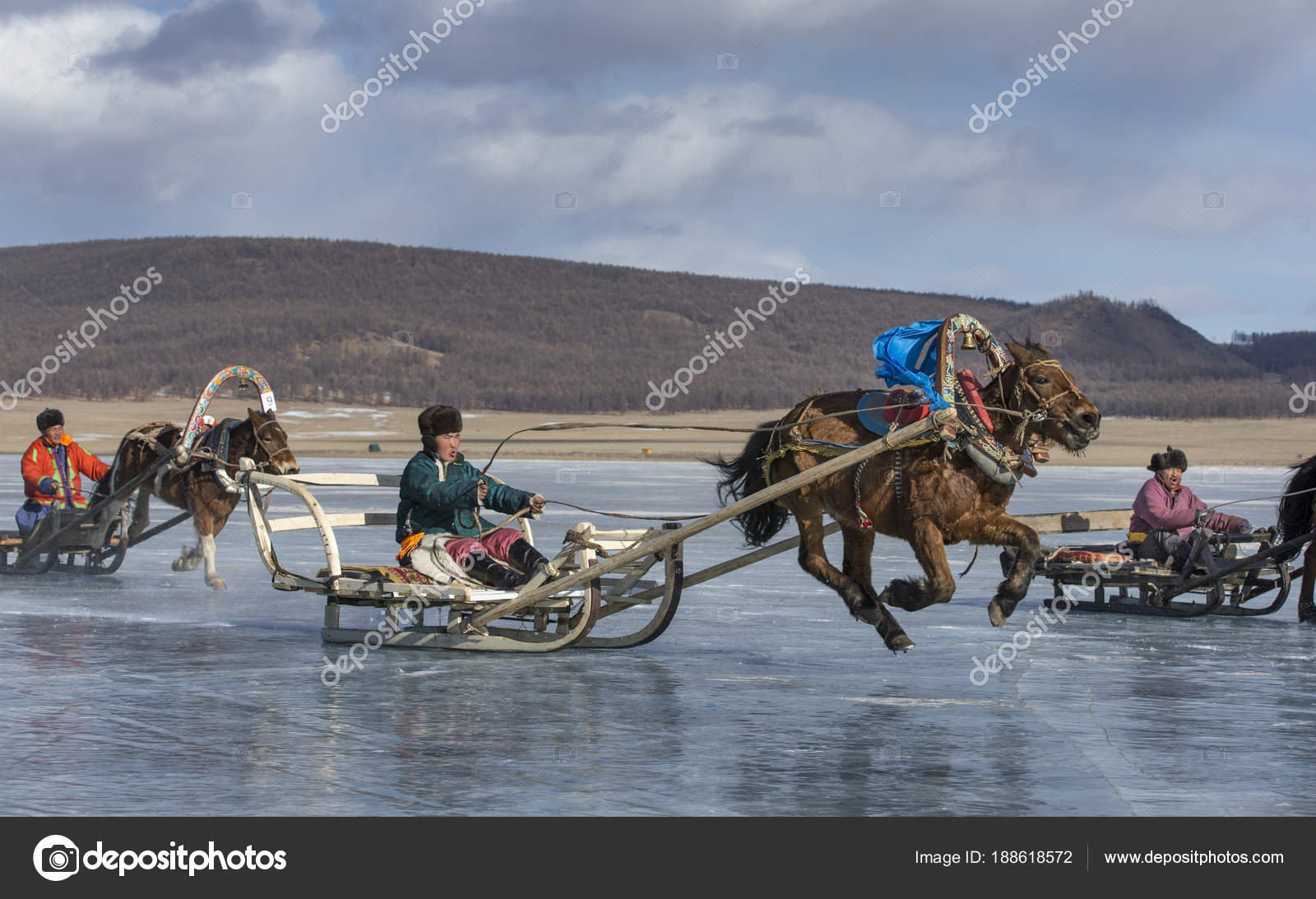 Mongolian people riding sledge — Stock Editorial Photo © katiekk #188618572