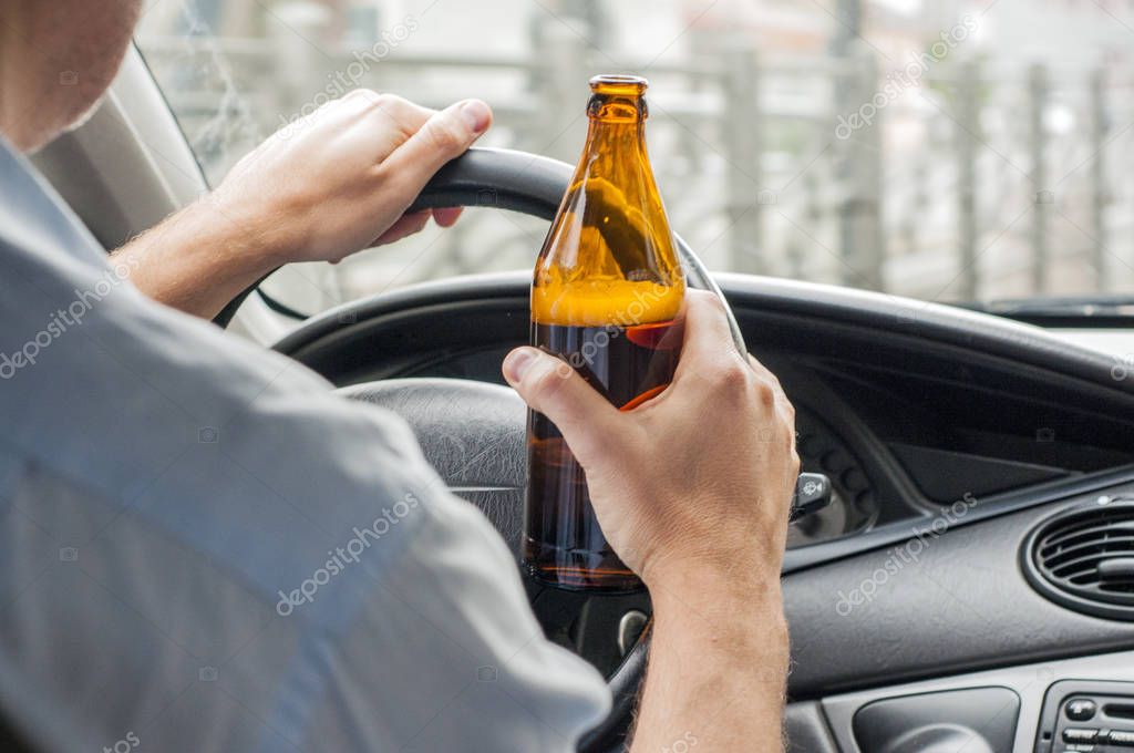 Transportation, alcohol, vehicle and people concept - close up of man ...