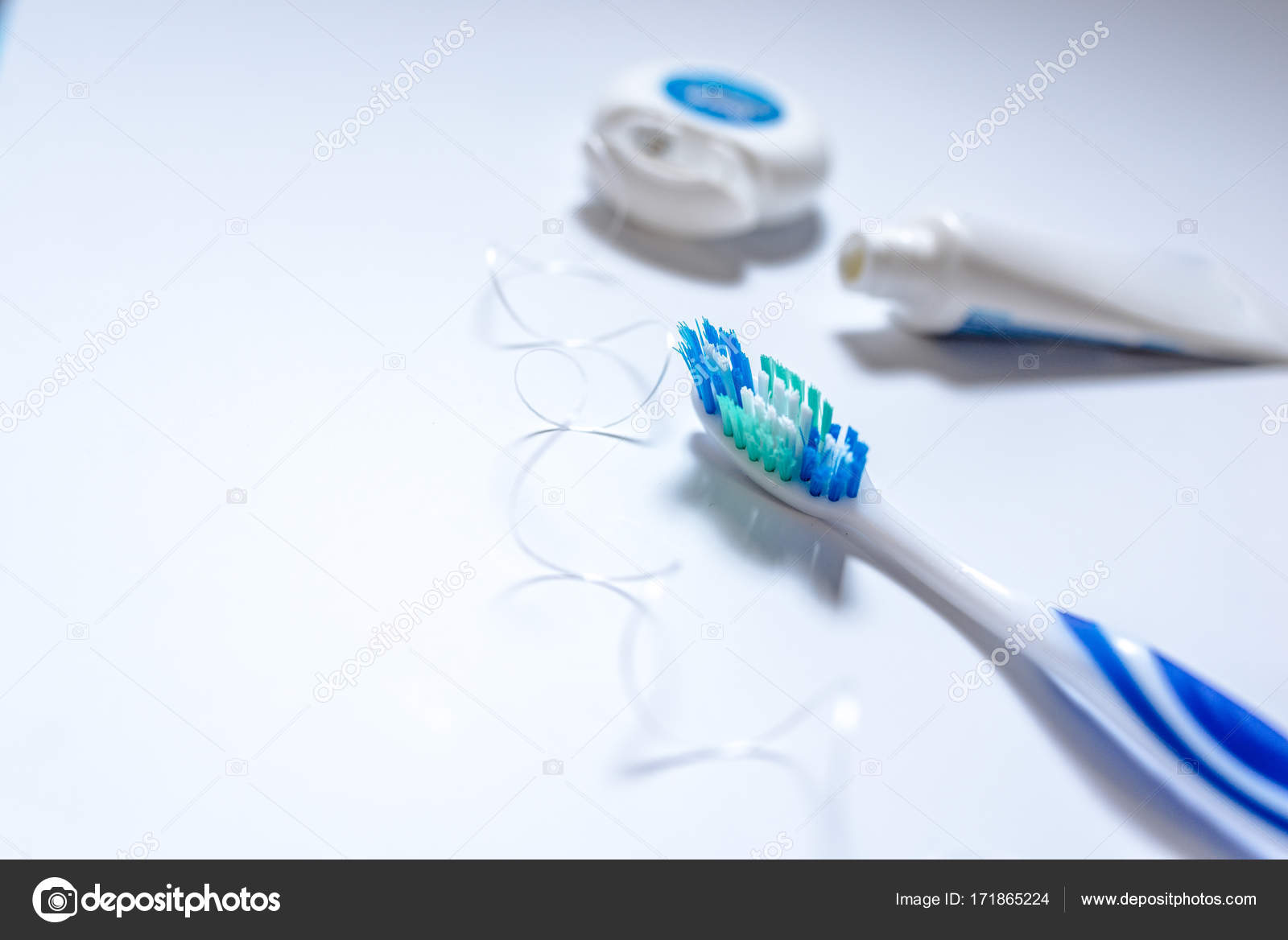 Toothbrush And Toothpaste And Floss