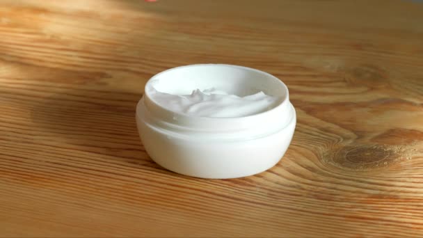 Woman applying hand cream Stock Photo by ©Dragonfly666 16861693