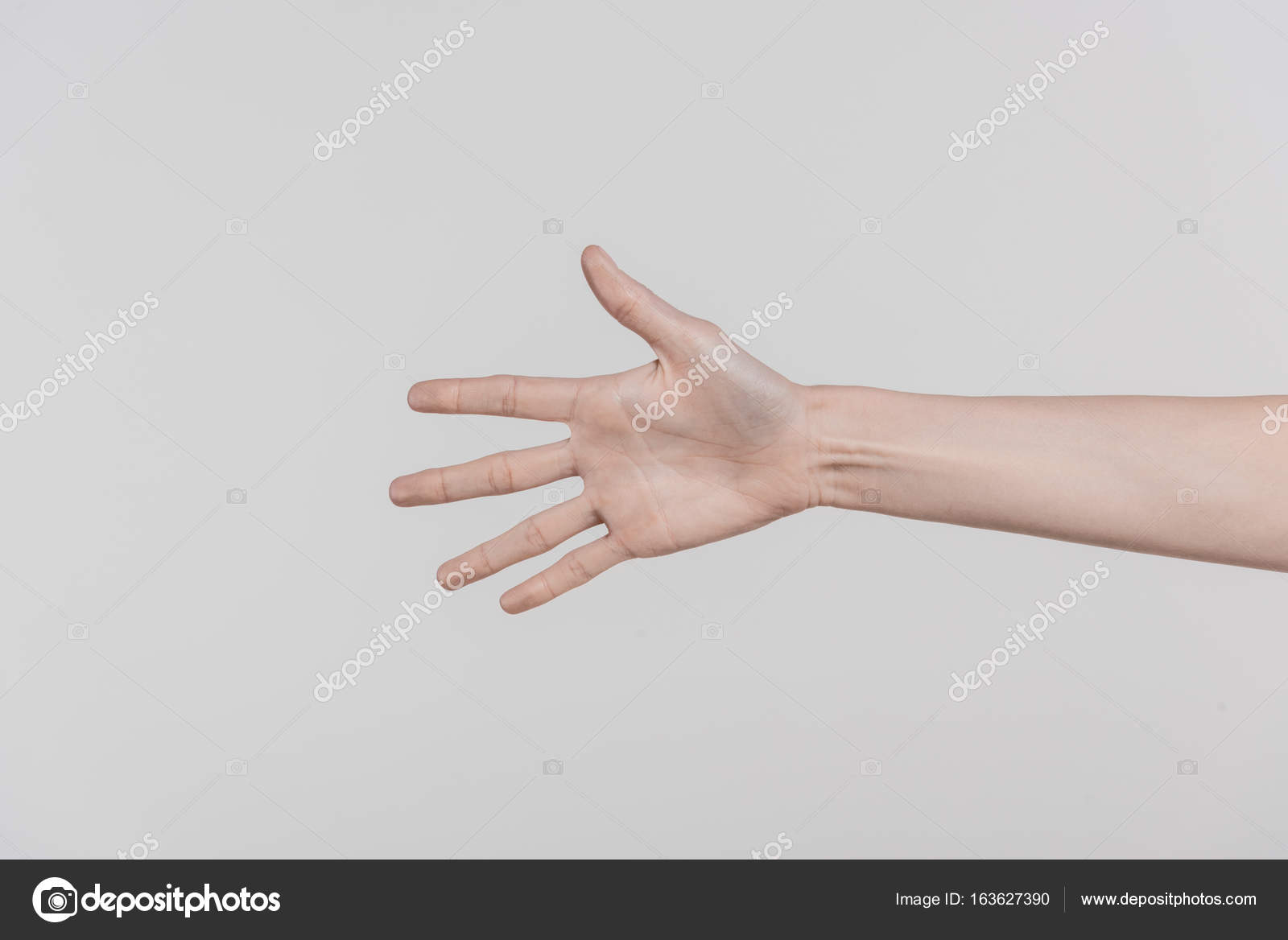 Stretching out hand — Stock Photo © RomanPashkovsky #163627390