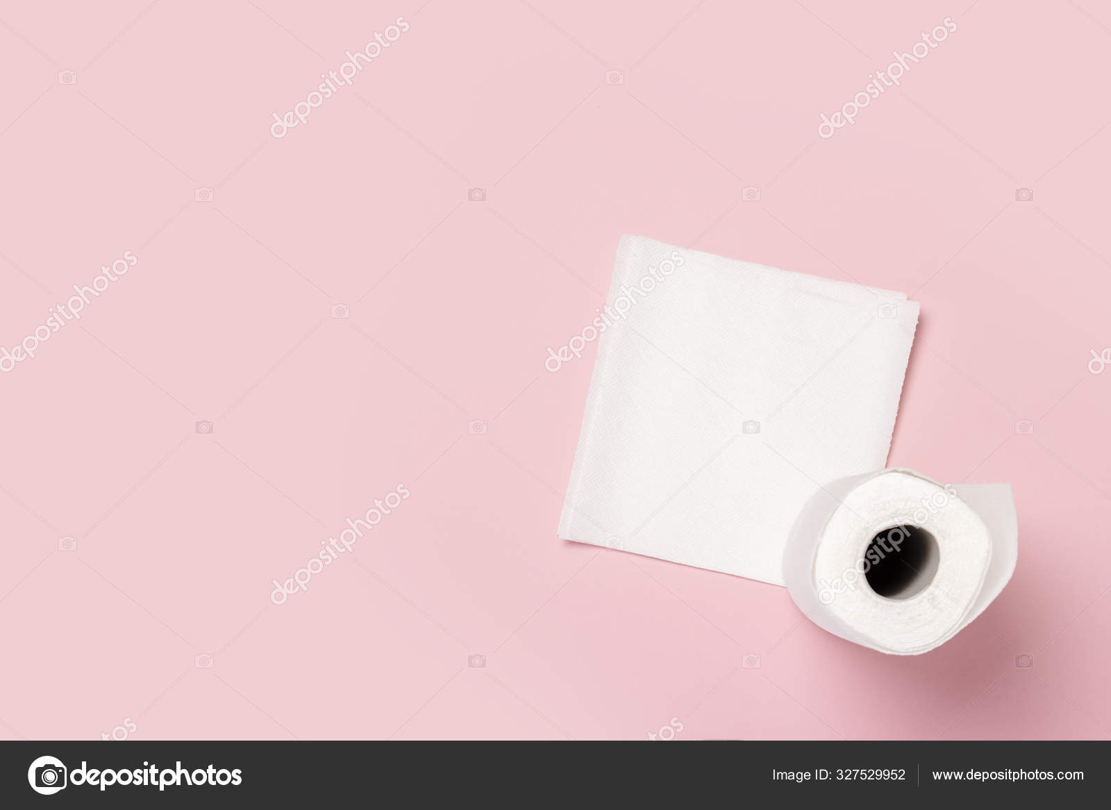 Roll of paper towels on a pink background. Concept is 100 natural ...