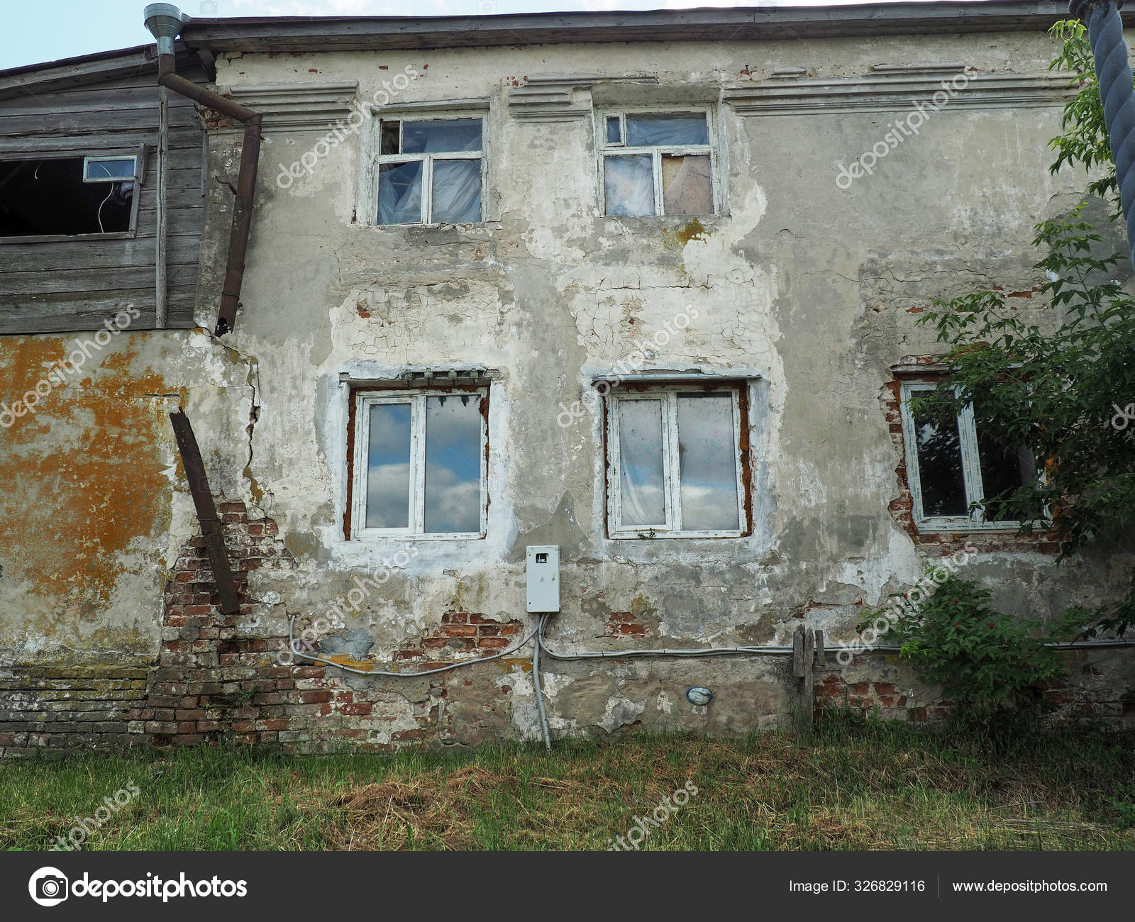 Old four-storey abandoned dilapidated house. Very old residential ...