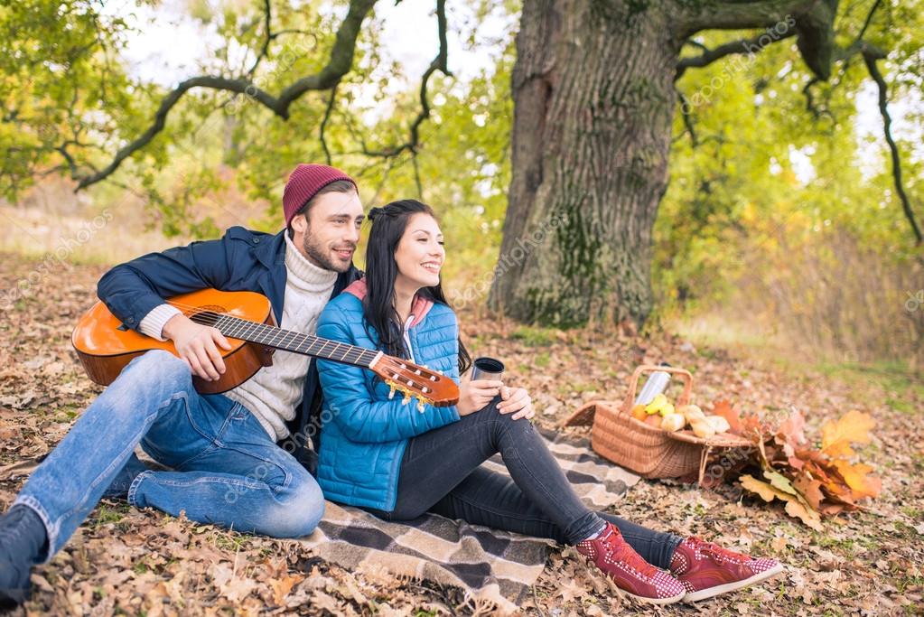 Romantic couple in autumn forest — Stock Photo © ArturVerkhovetskiy ...