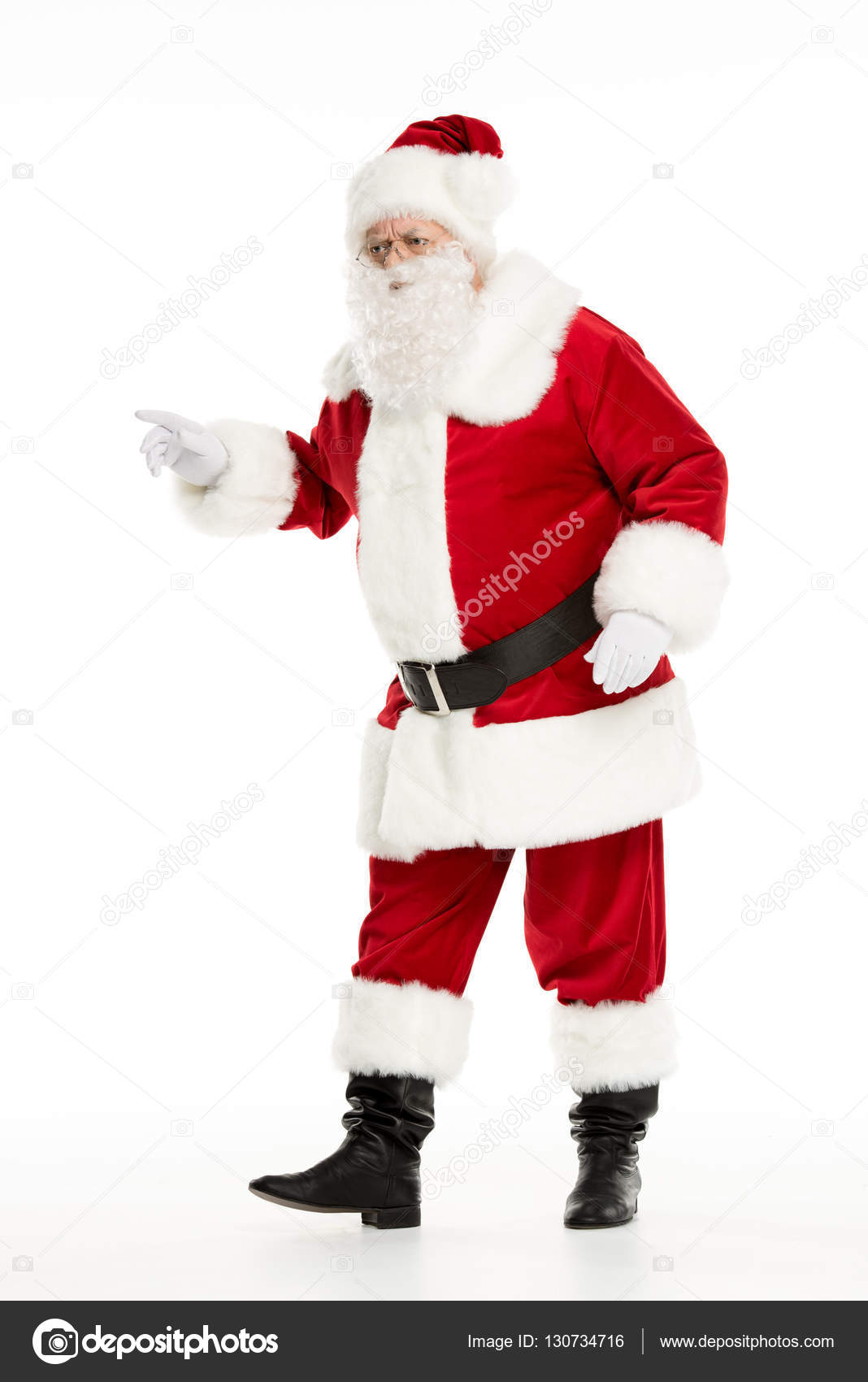 Santa Claus posing and gesturing — Stock Photo © ArturVerkhovetskiy ...