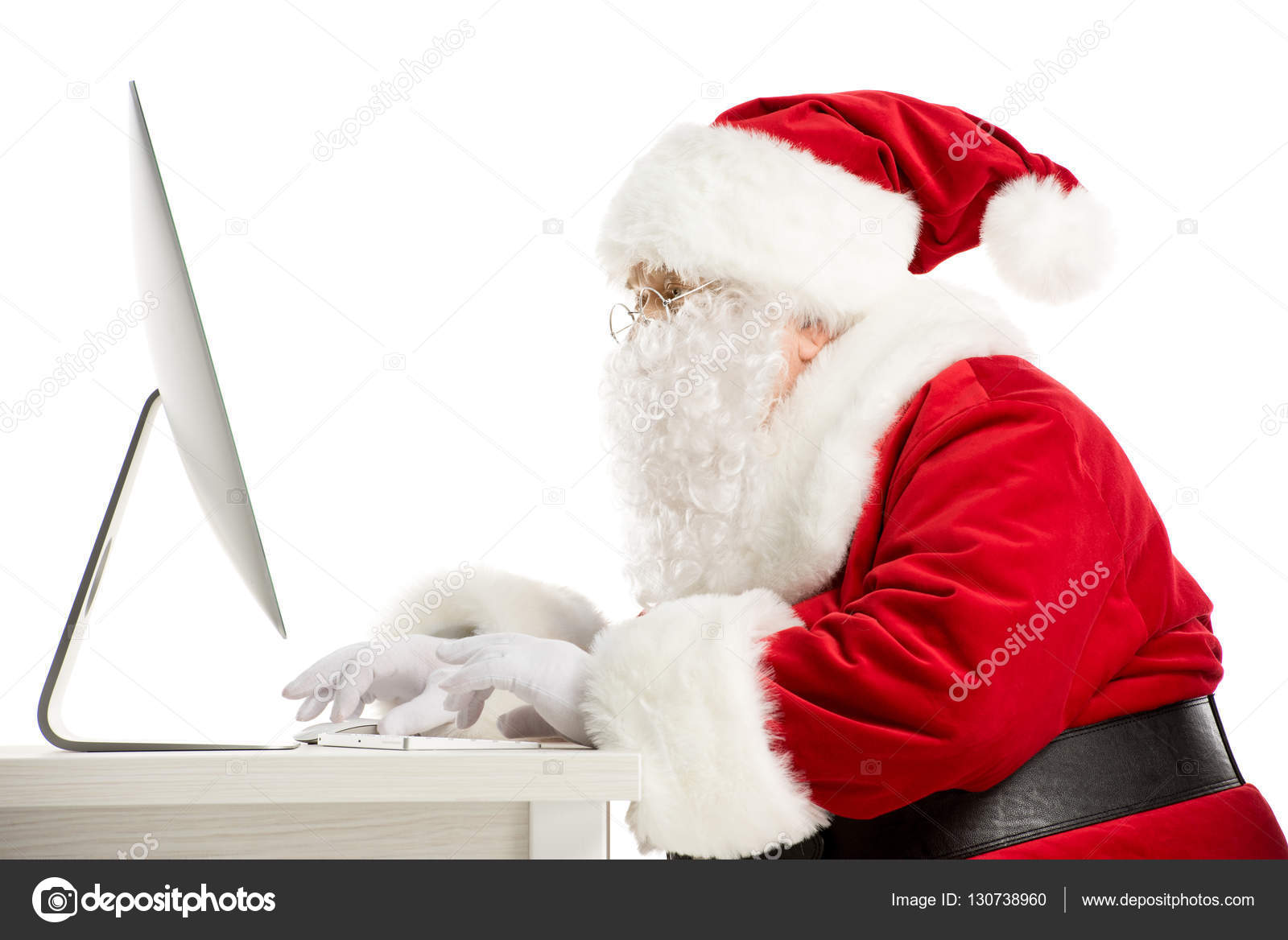 Santa Claus using computer — Free Stock Photo © ArturVerkhovetskiy ...