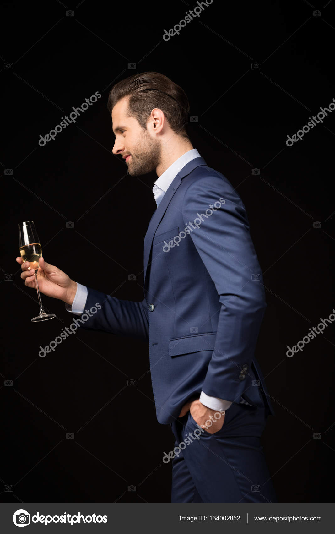 Young man celebrating — Stock Photo © ArturVerkhovetskiy #134002852