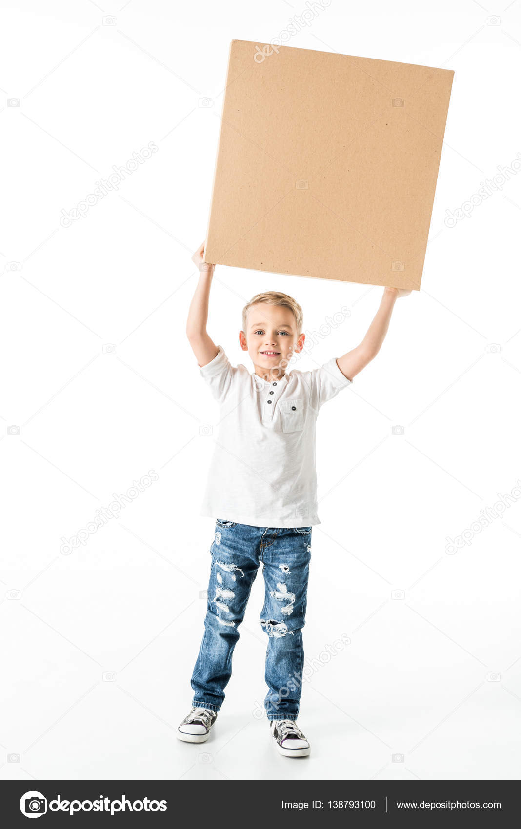 Boy with cardboard box Stock Photo by ©ArturVerkhovetskiy 138793100
