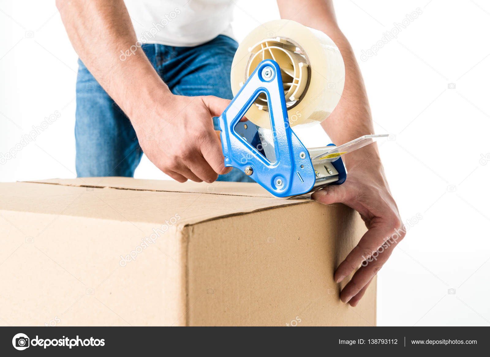 Man packing box — Stock Photo © ArturVerkhovetskiy #138793112