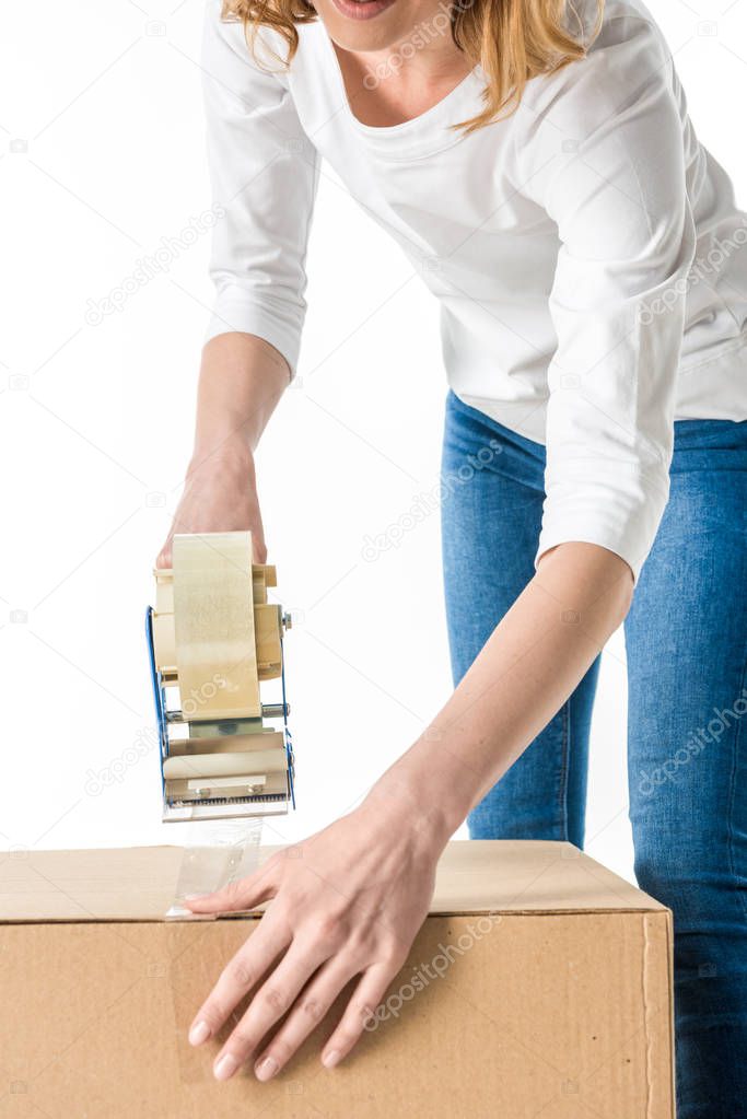 Woman packing box — Stock Photo © ArturVerkhovetskiy #138793134