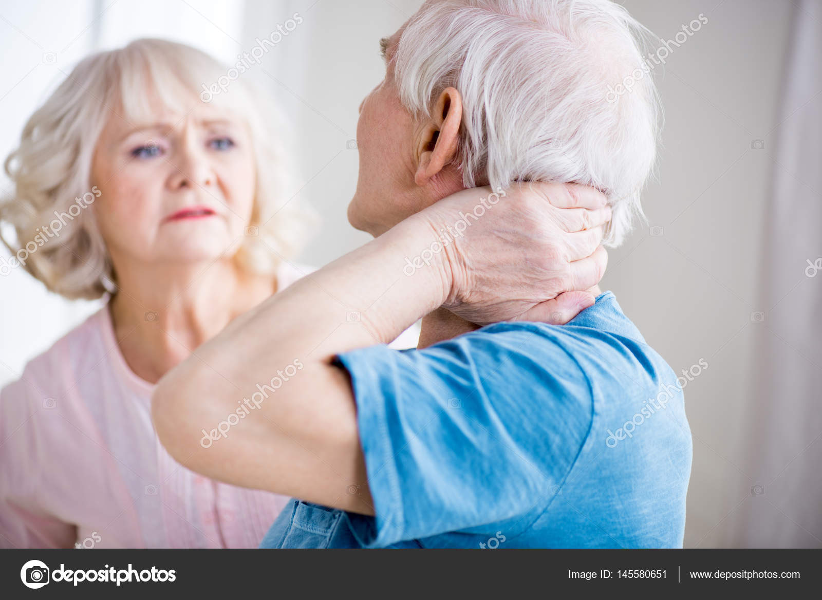 Man with neck pain ⬇ Stock Photo, Image by © ArturVerkhovetskiy #145580651