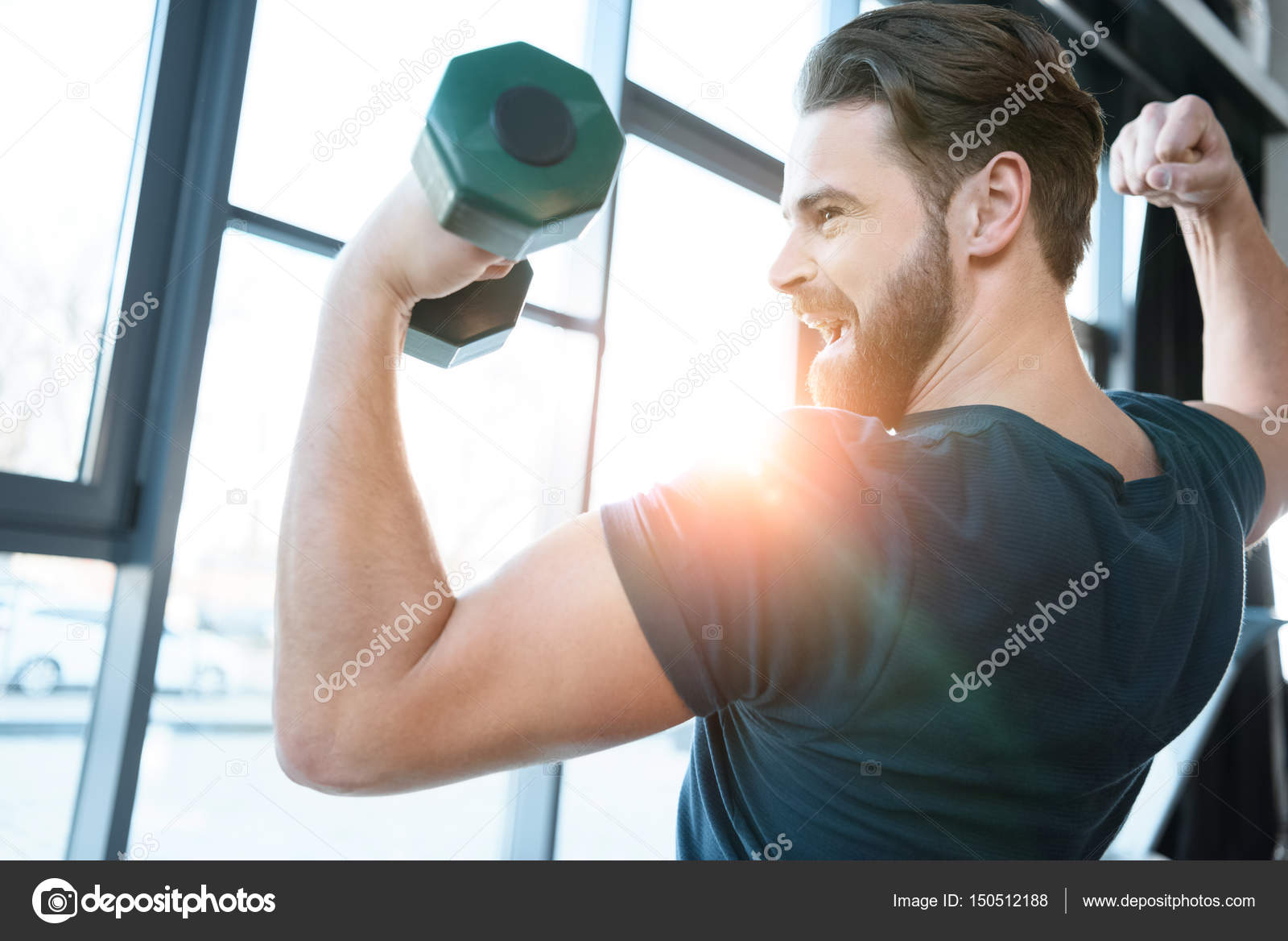 Handsome young guy workout with dumbbell — Stock Photo ...
