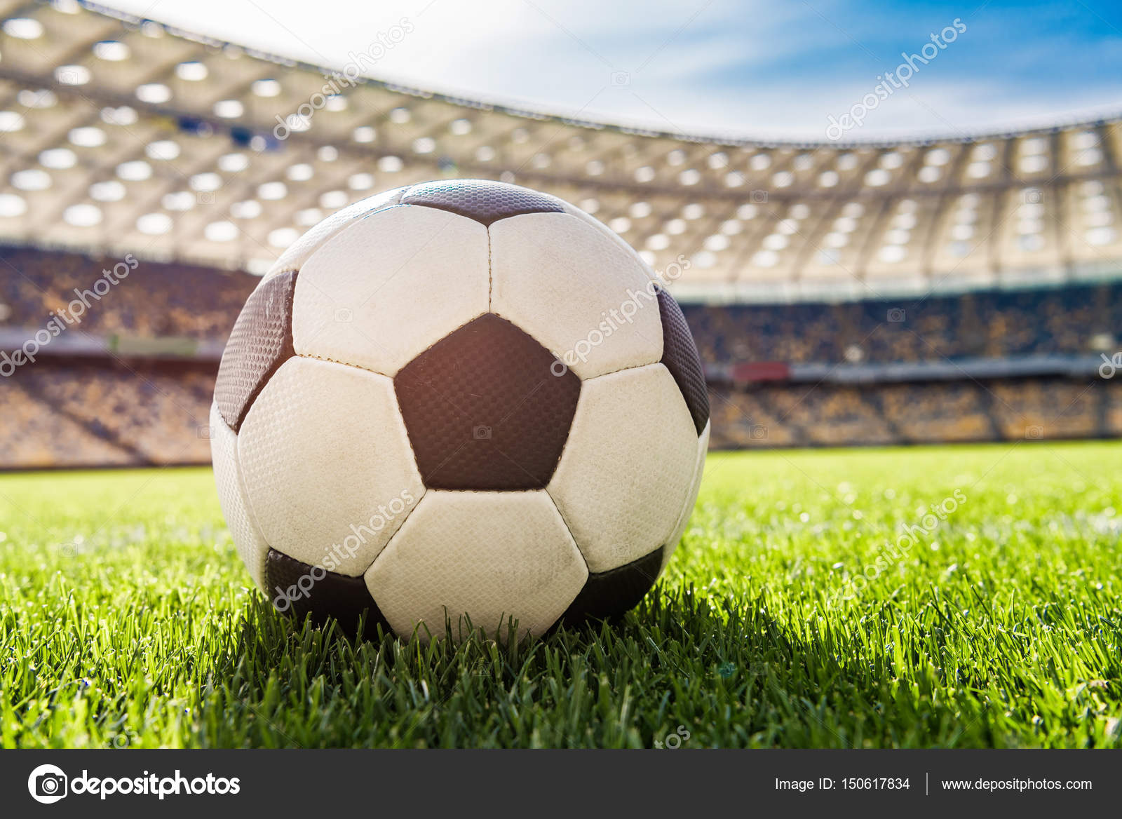 Soccer ball on grass — Stock Photo © ArturVerkhovetskiy #150617834