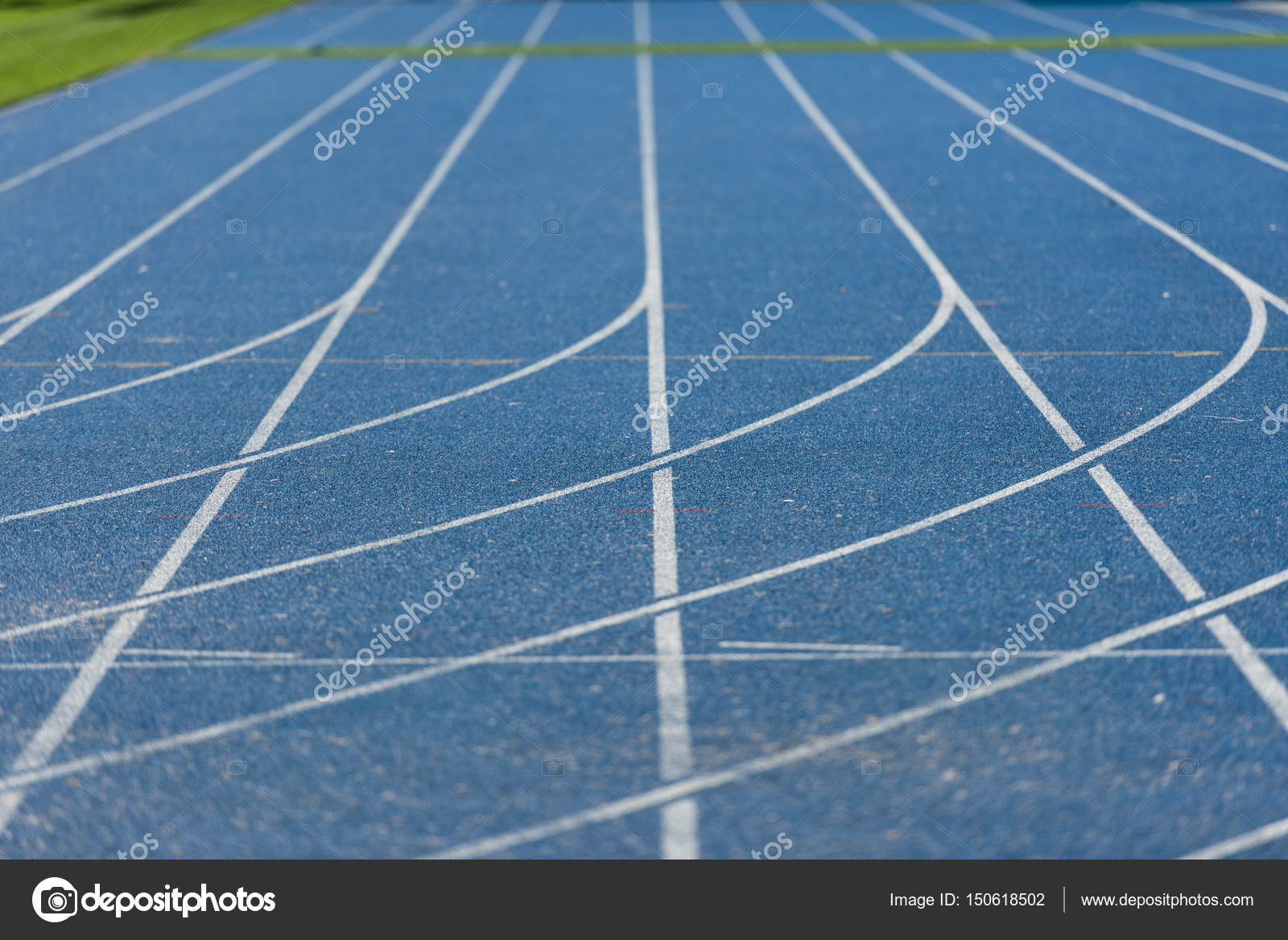 Blue running track — Stock Photo © ArturVerkhovetskiy #150618502 Blue running track — Stock Photo © ArturVerkhovetskiy #150618502