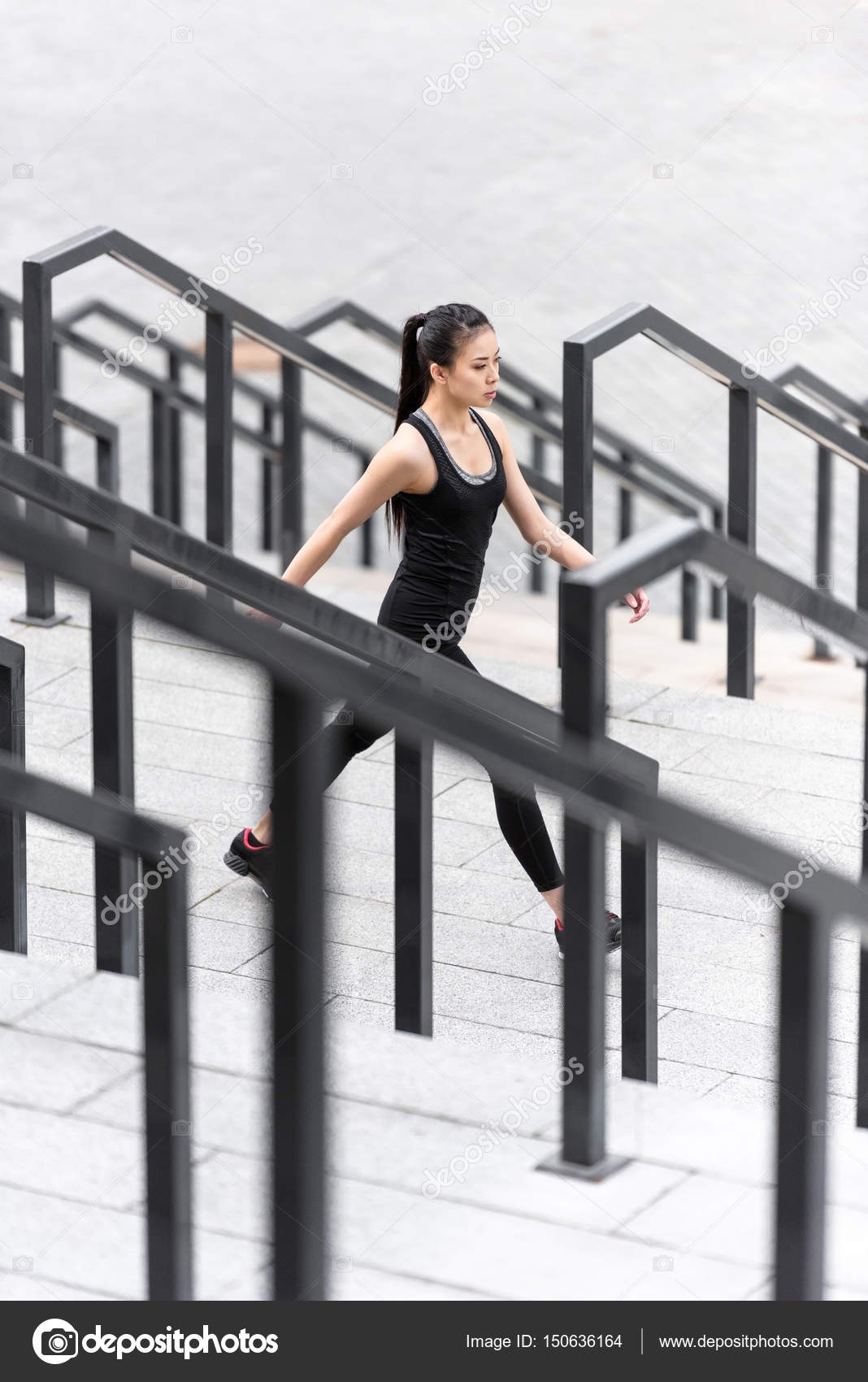 Sportswoman training on stadium stairs — Free Stock Photo ...
