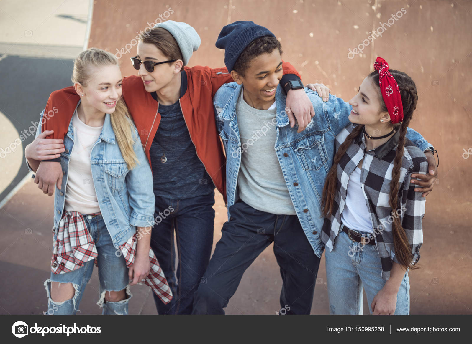 Teenagers spending time at skateboard park — Stock Photo ...