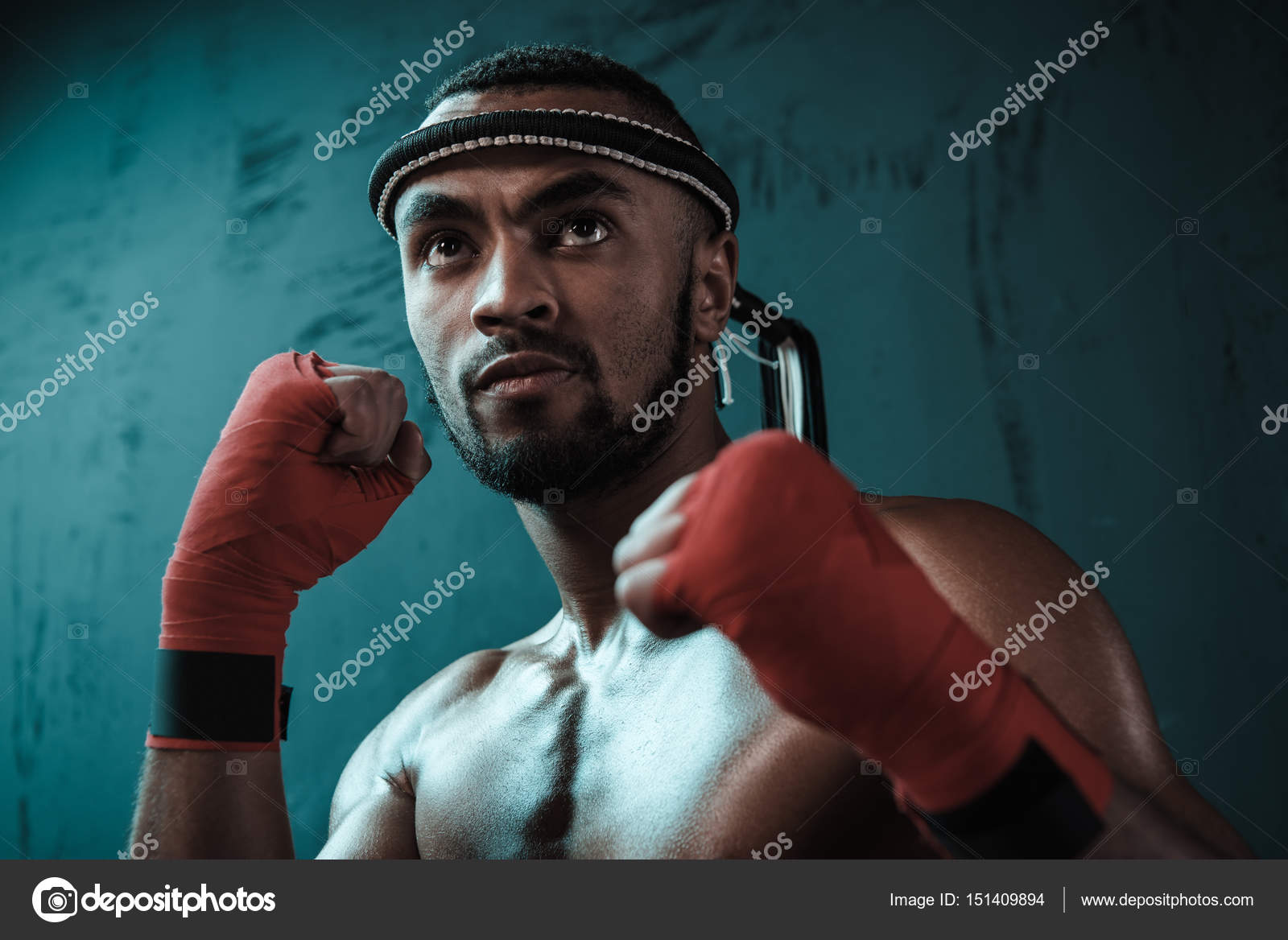 Muay Thai athlete — Stock Photo © ArturVerkhovetskiy #151409894
