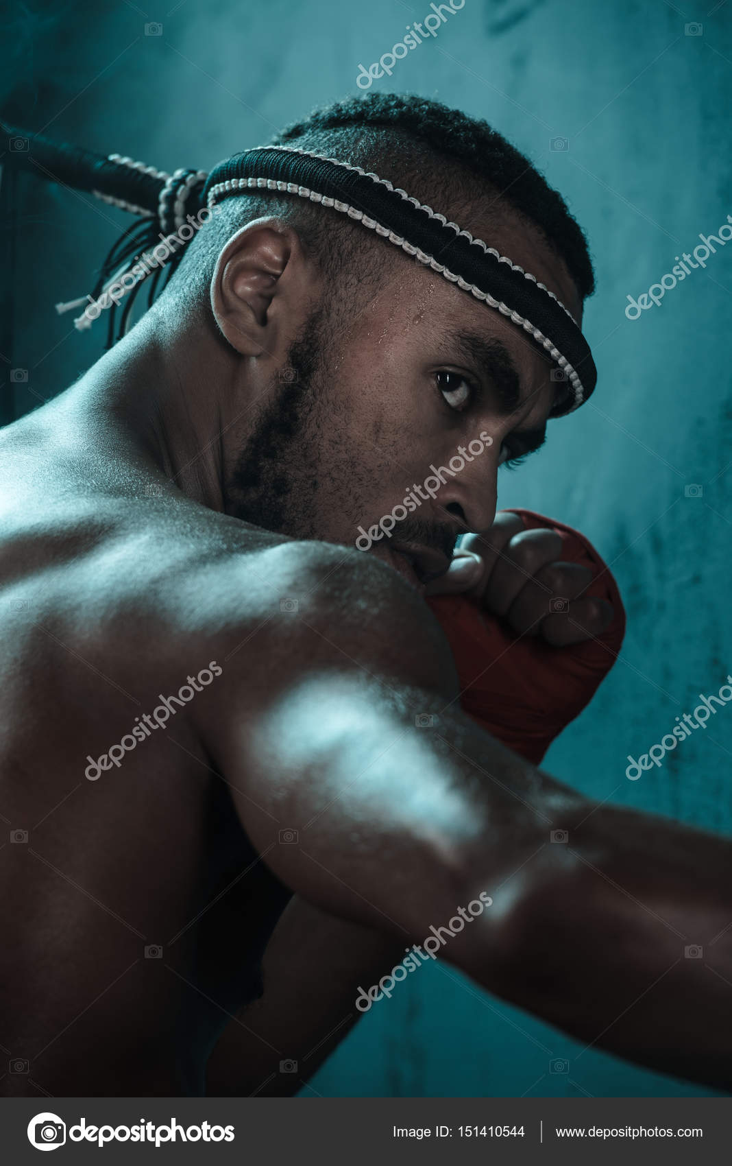 Muay Thai athlete — Free Stock Photo © ArturVerkhovetskiy #151410544 Muay Thai athlete — Free Stock Photo © ArturVerkhovetskiy #151410544