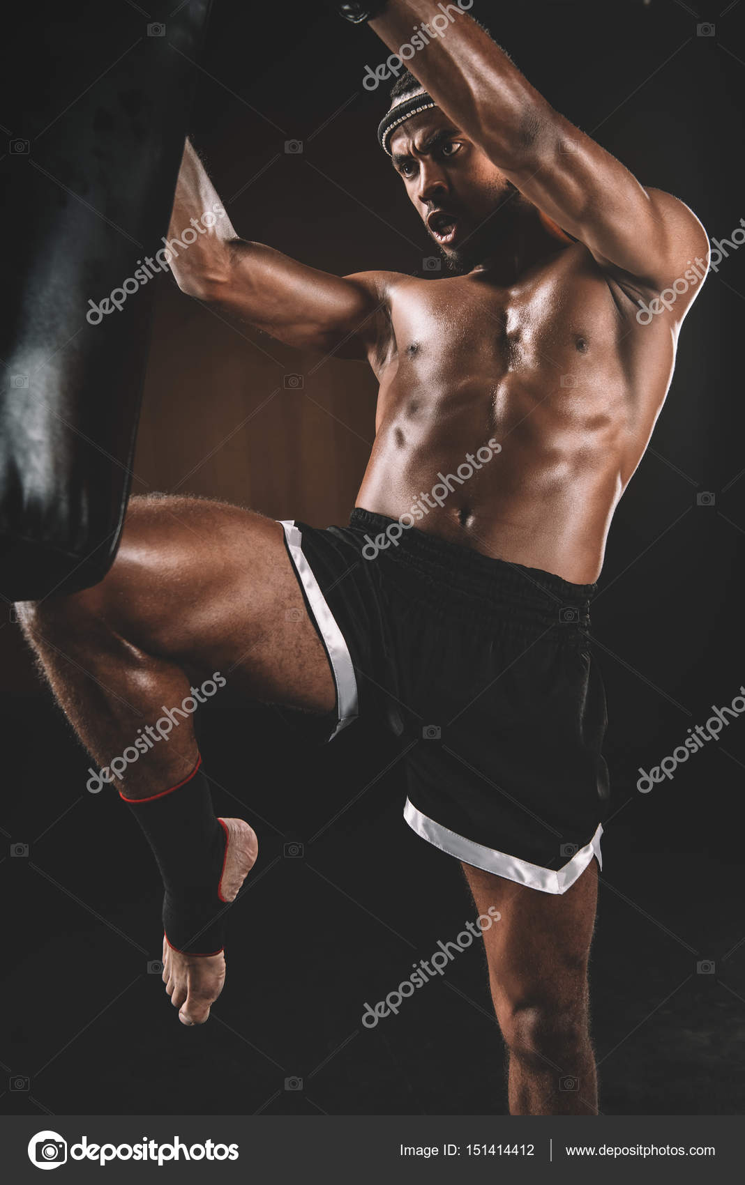 Muay thai fighter — Stock Photo © ArturVerkhovetskiy #151414412