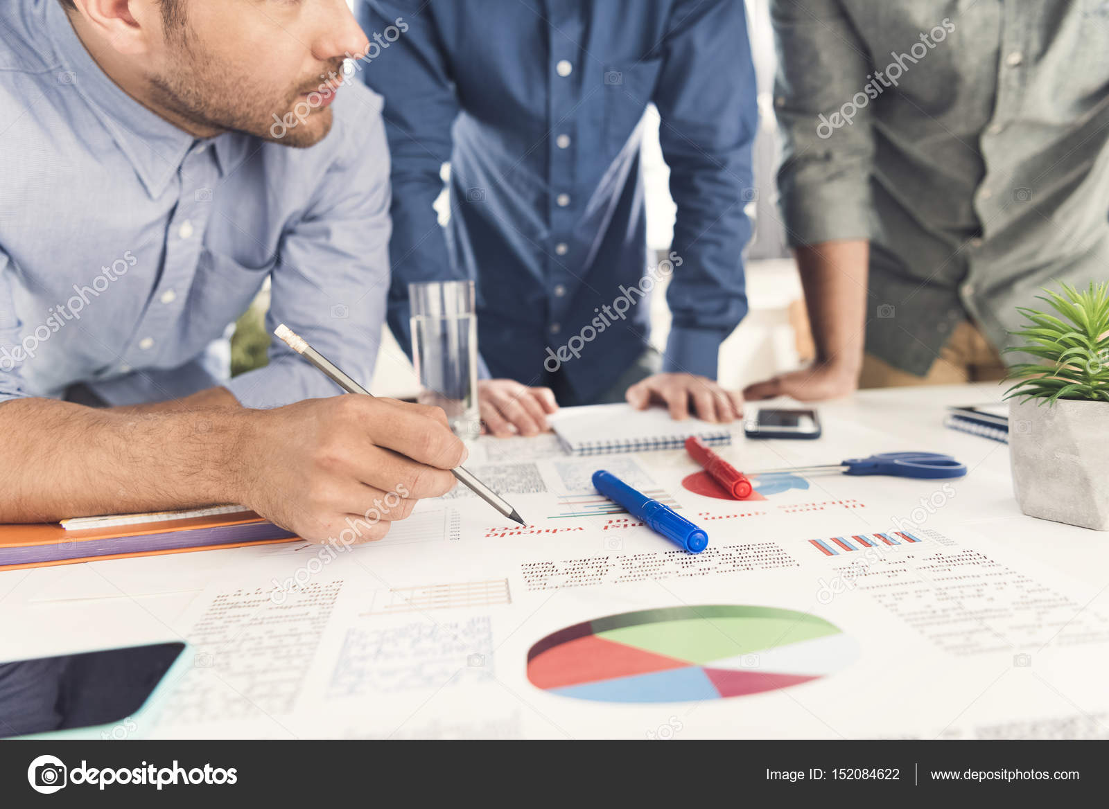 Businessmen working on project — Stock Photo © ArturVerkhovetskiy ...