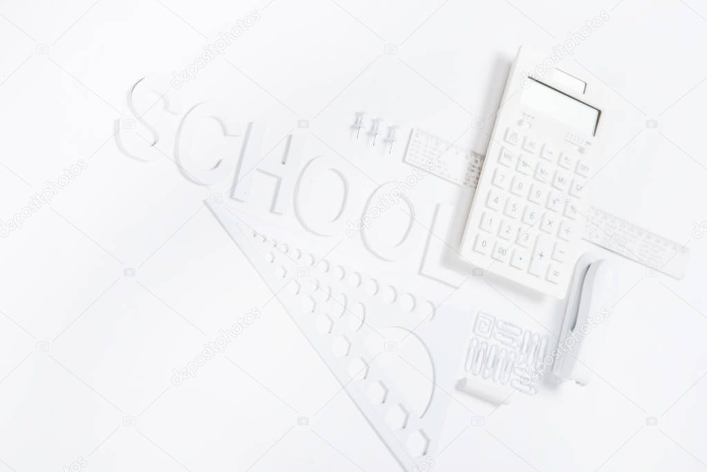 Calculator with rulers and stapler with compasses — Free Stock Photo ...