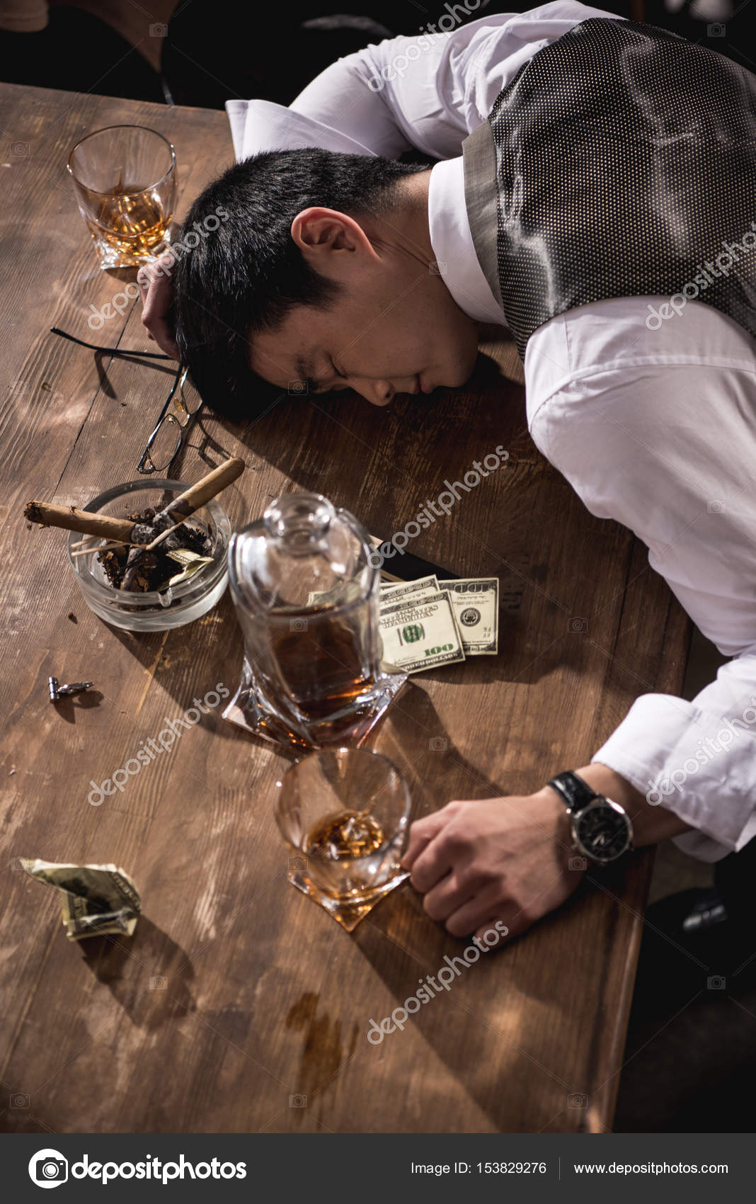 Side view of drunk businessman sleeping at table after party — Free ...