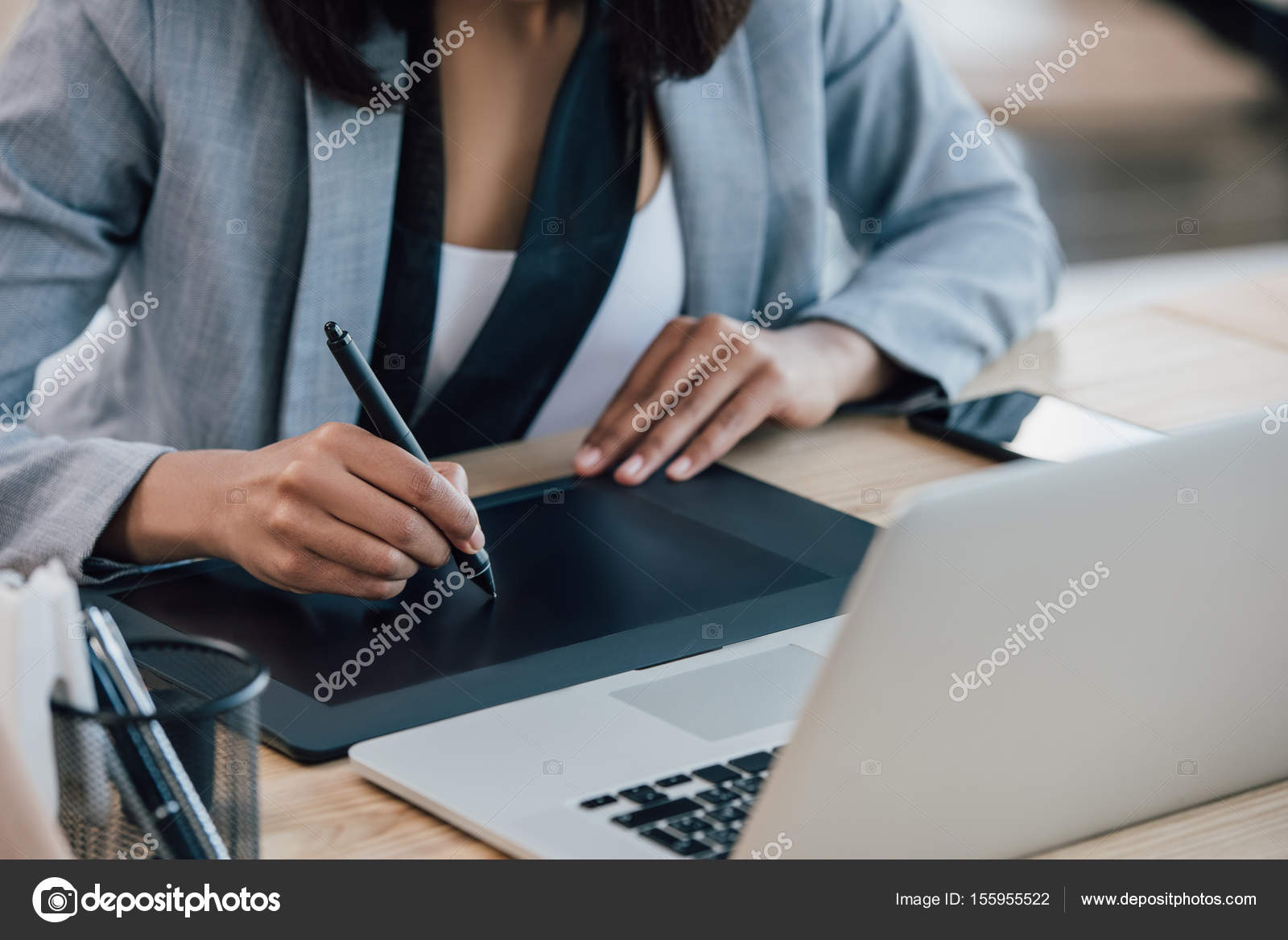 Businesswoman using graphic tablet — Stock Photo © ArturVerkhovetskiy ...