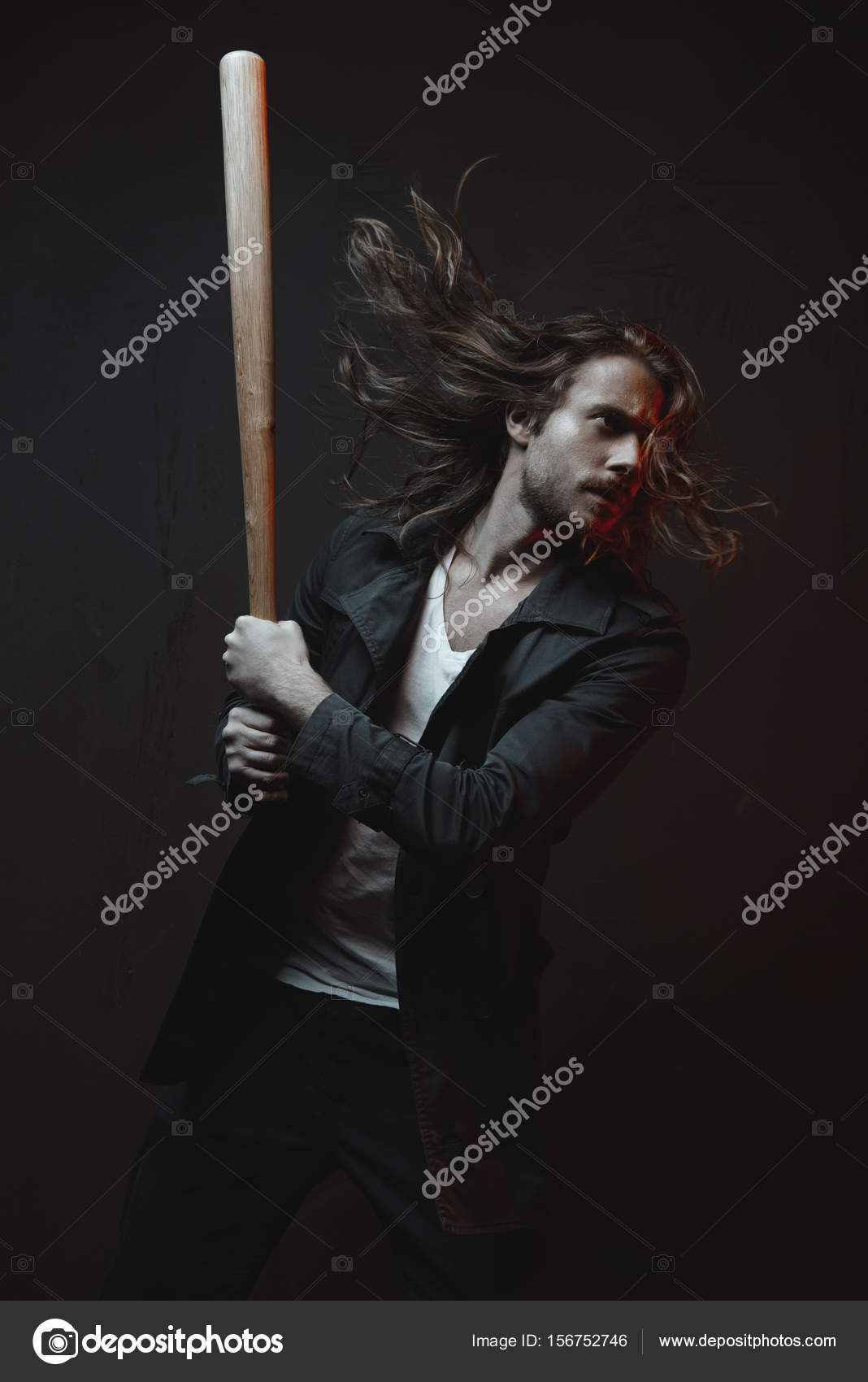 Young man with baseball bat — Stock Photo © ArturVerkhovetskiy #156752746