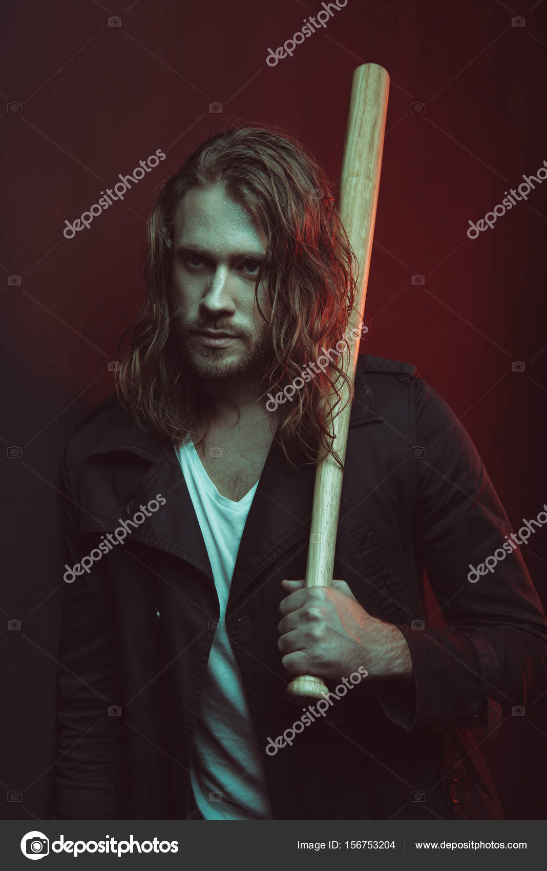 Young man with baseball bat Stock Photo by ©ArturVerkhovetskiy 156753204