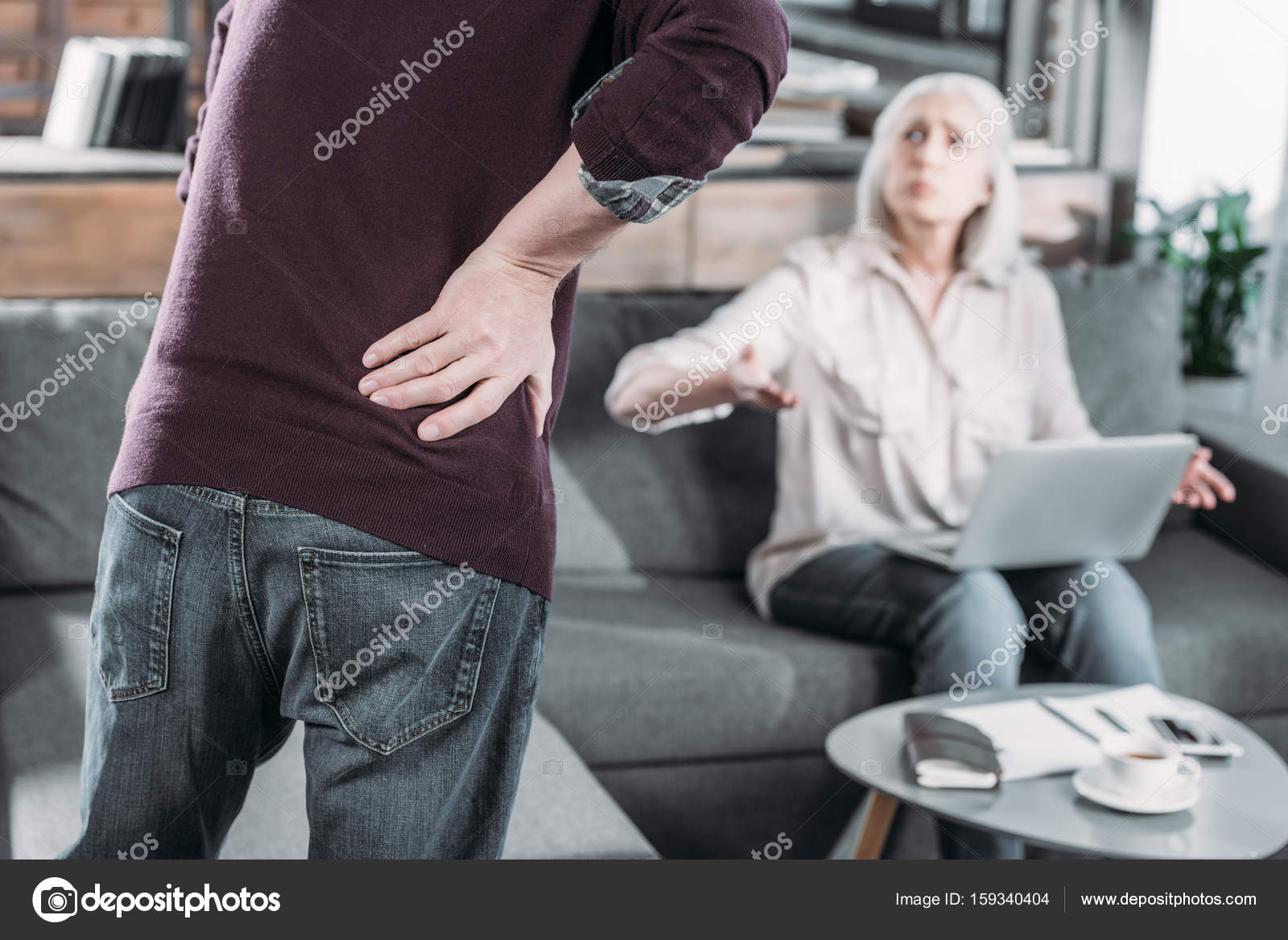 Man having back pain — Stock Photo © ArturVerkhovetskiy #159340404