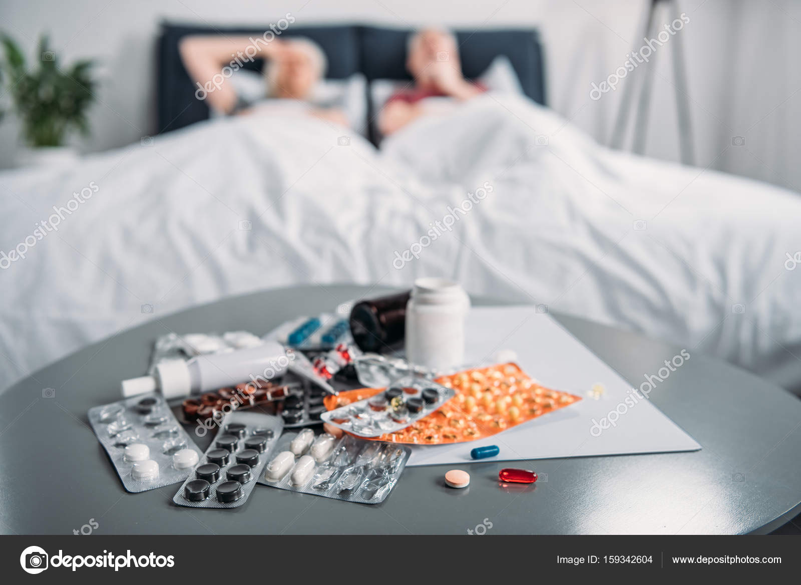 Various medicines on table — Stock Photo © ArturVerkhovetskiy #159342604
