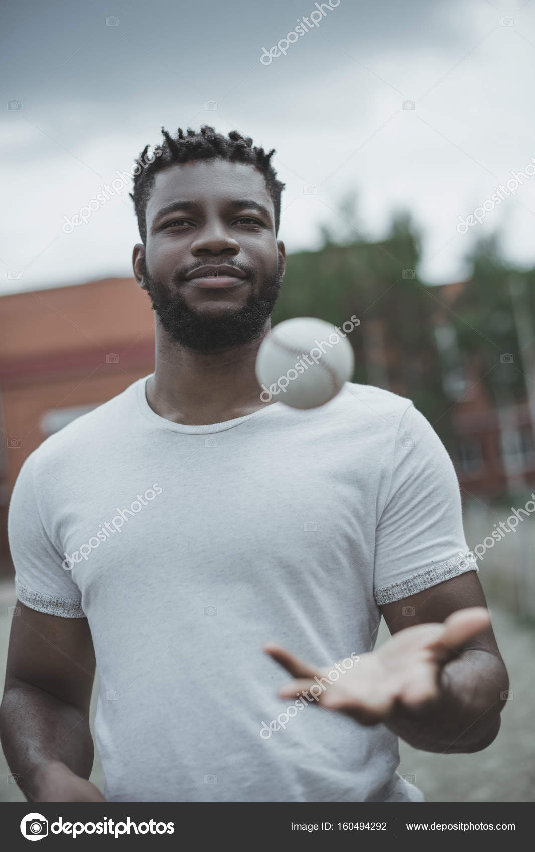 Handsome baseball player — Stock Photo © ArturVerkhovetskiy #160494292