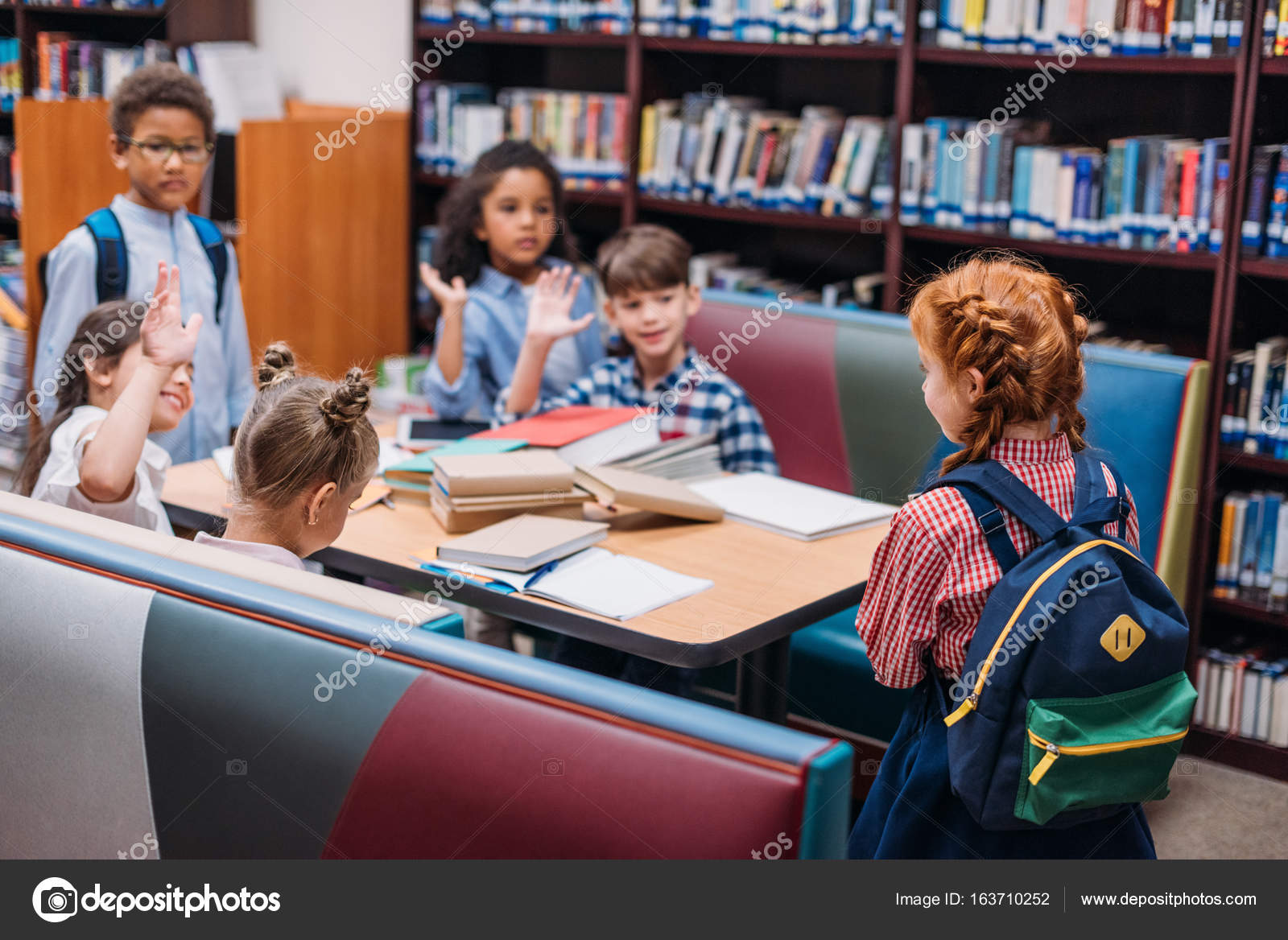 Little kids in library Stock Photo by ©ArturVerkhovetskiy 163710252