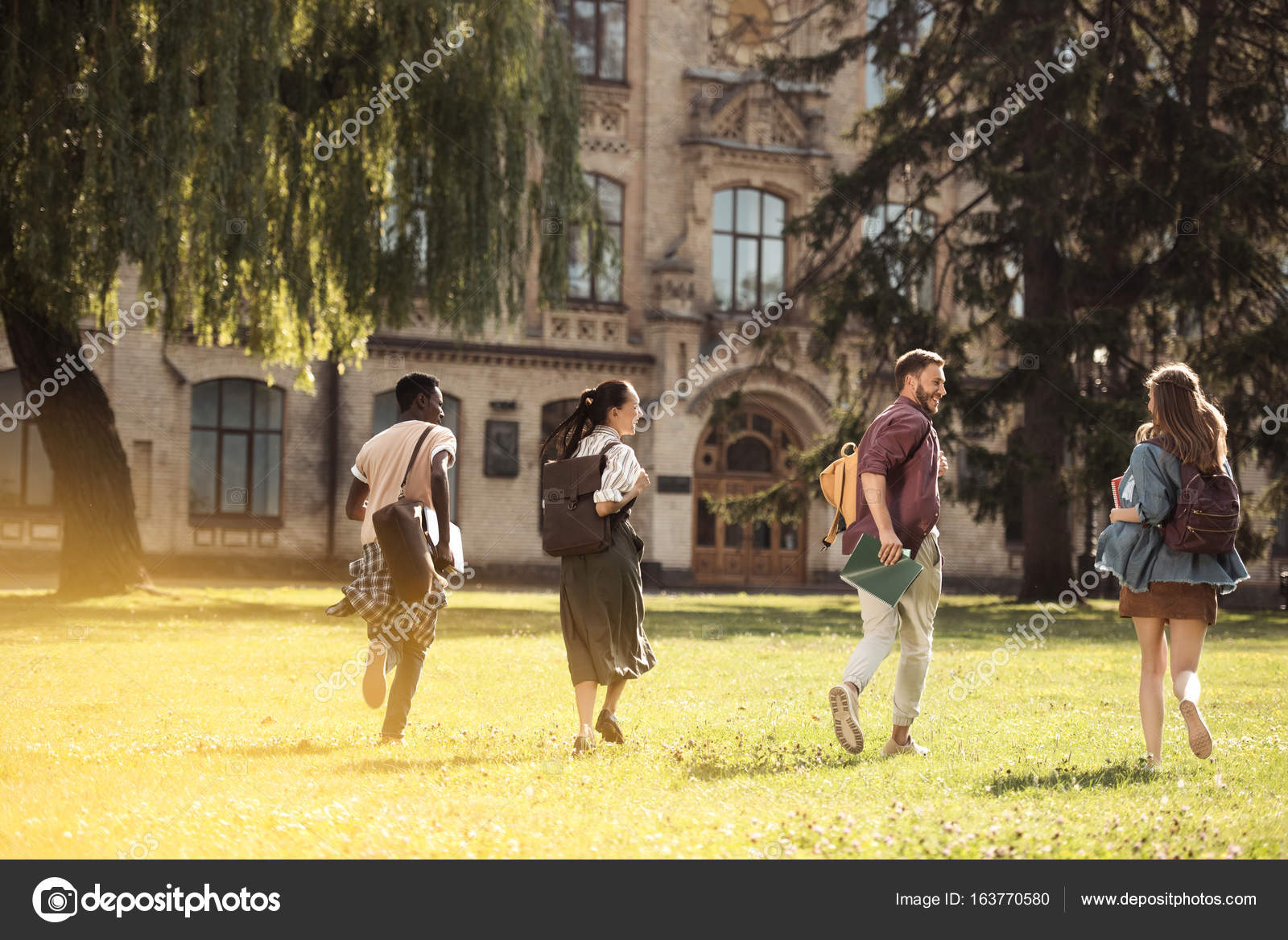Students running to university — Stock Photo © ArturVerkhovetskiy ...