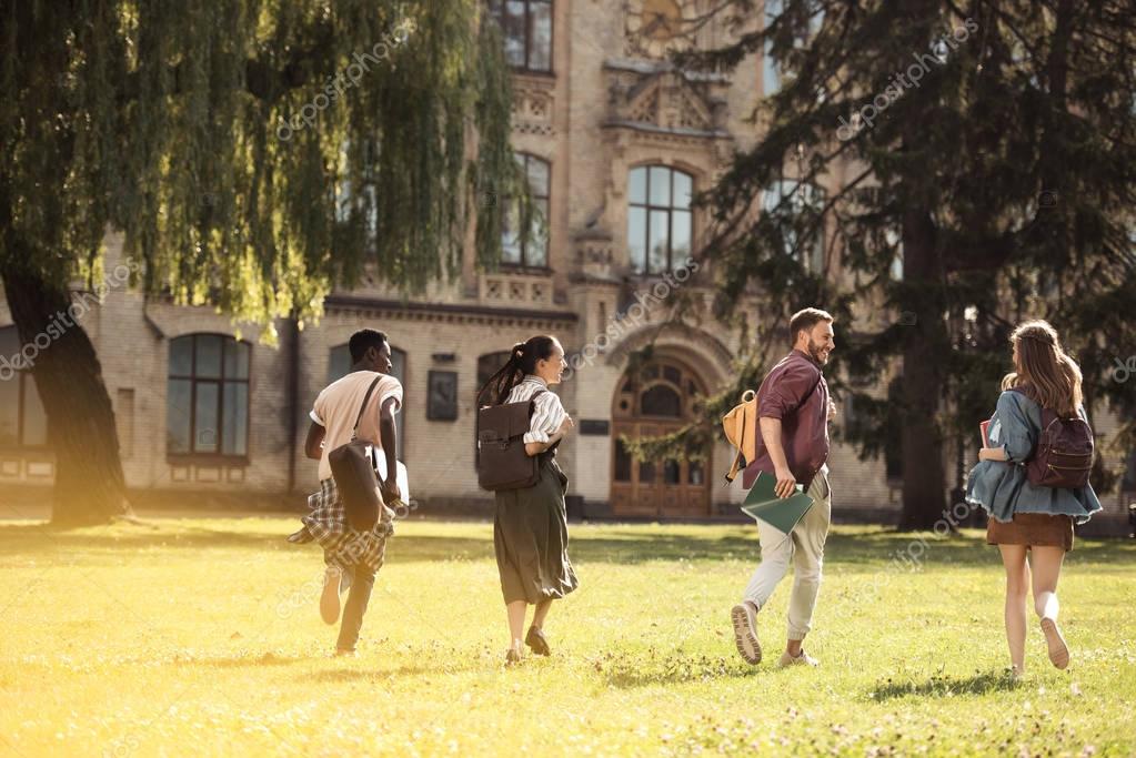 Students running to university — Stock Photo © ArturVerkhovetskiy ...