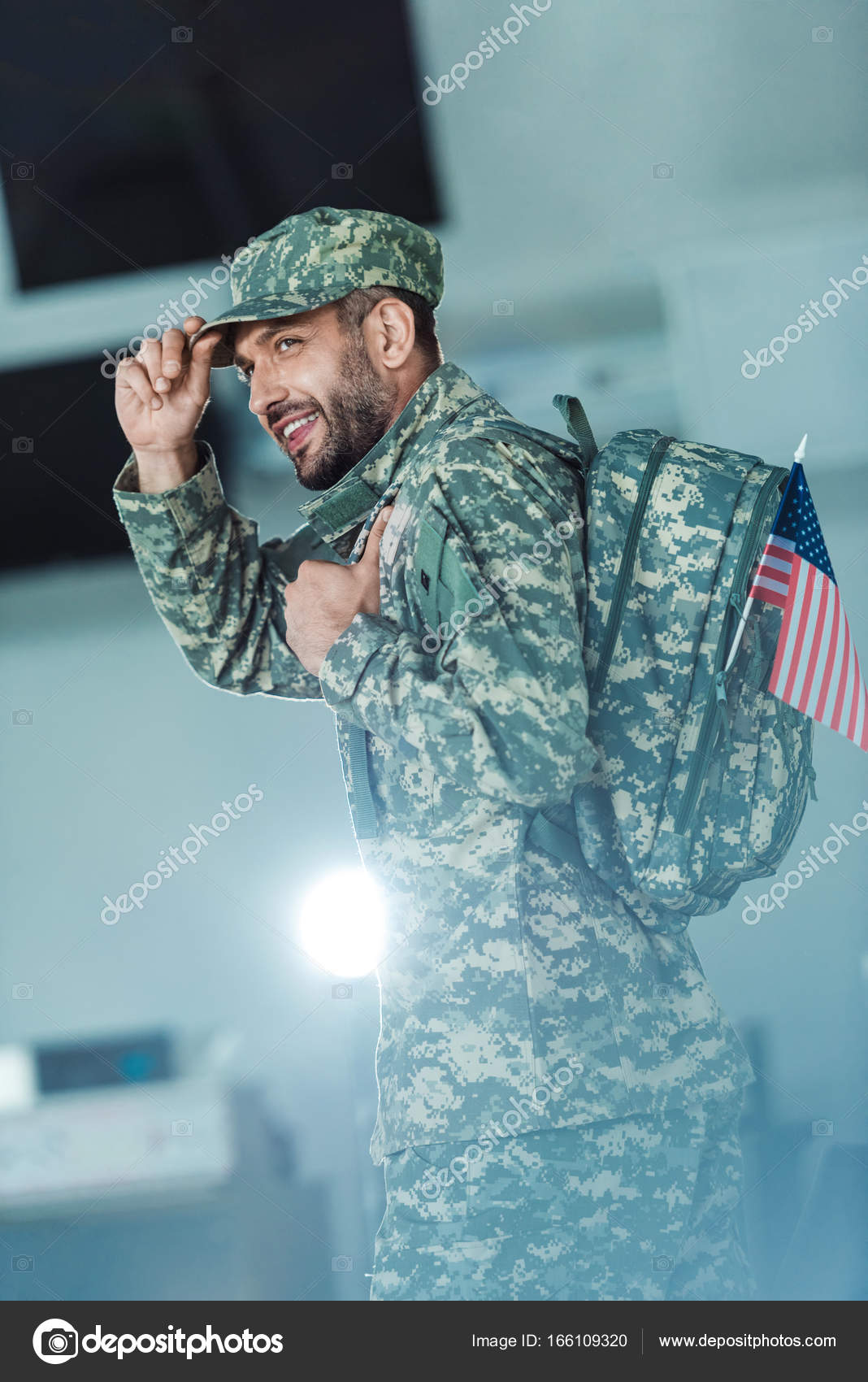 Smiling soldier in military form — Stock Photo © ArturVerkhovetskiy ...