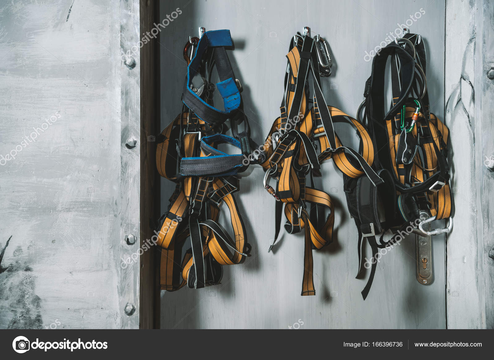 Climbing wall harnesses — Stock Photo © ArturVerkhovetskiy #166396736