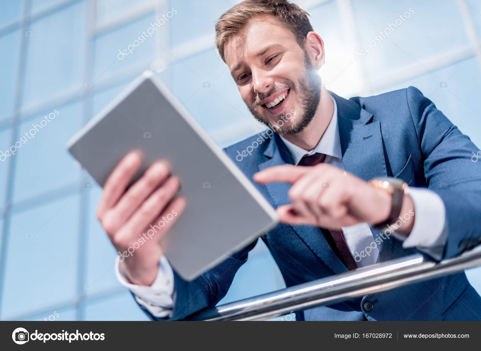 Businessman using digital tablet — Stock Photo © ArturVerkhovetskiy ...
