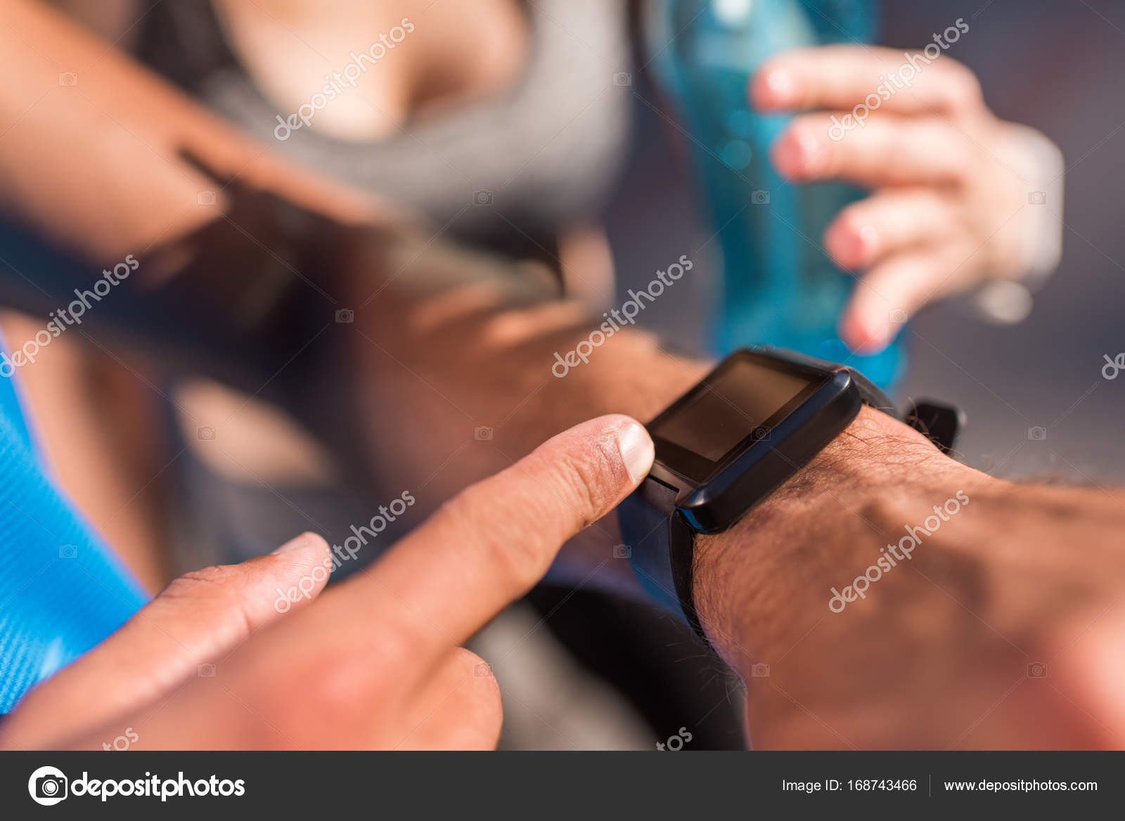 Man with smart watch Stock Photo by ©ArturVerkhovetskiy 168743466