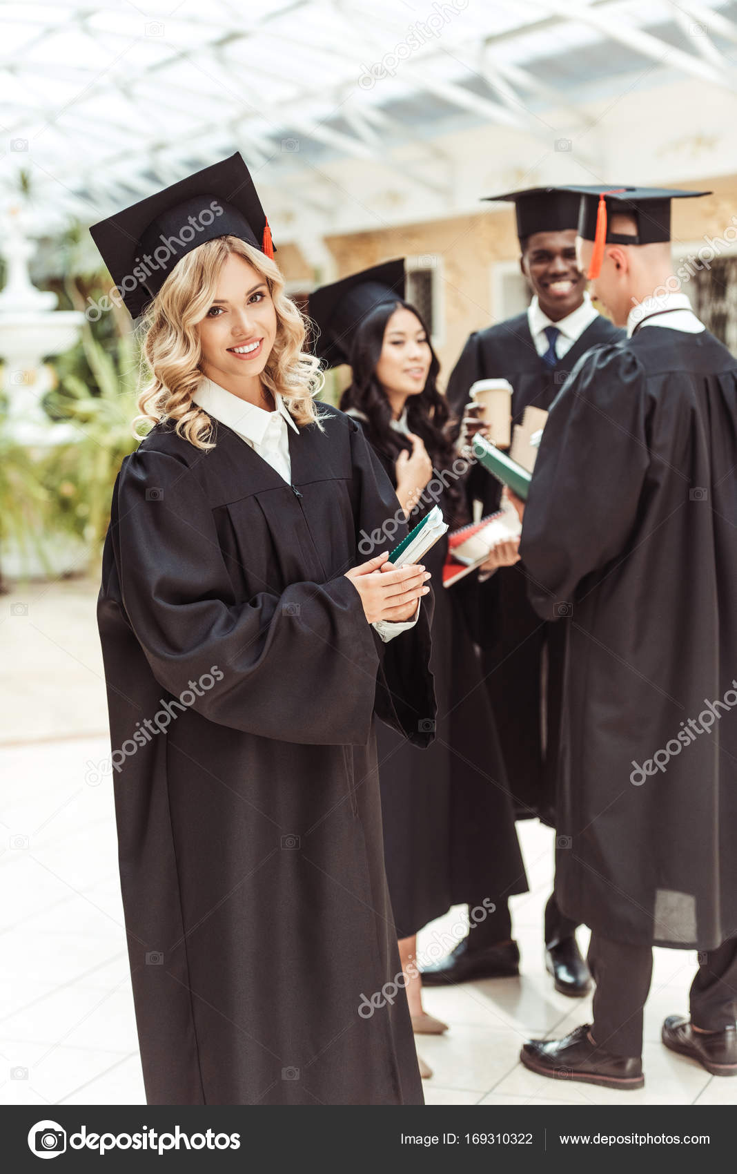 Student girl in graduation costume — Stock Photo © ArturVerkhovetskiy ...
