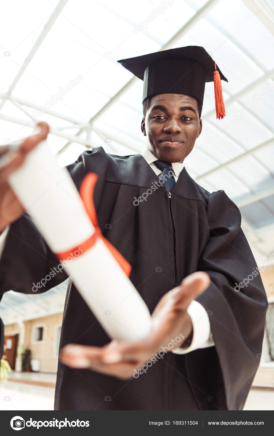 Graduated student — Stock Photo © ArturVerkhovetskiy #169311504