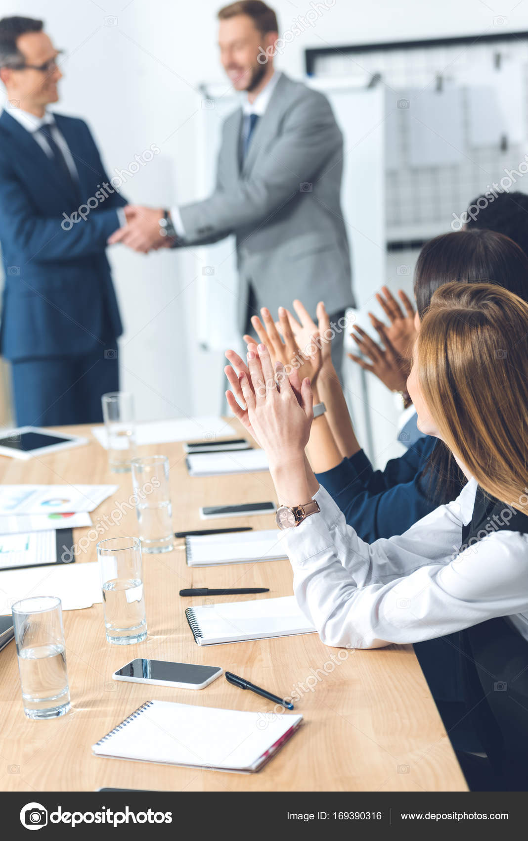 Boss shaking hand of manager Stock Photo by ©ArturVerkhovetskiy 169390316