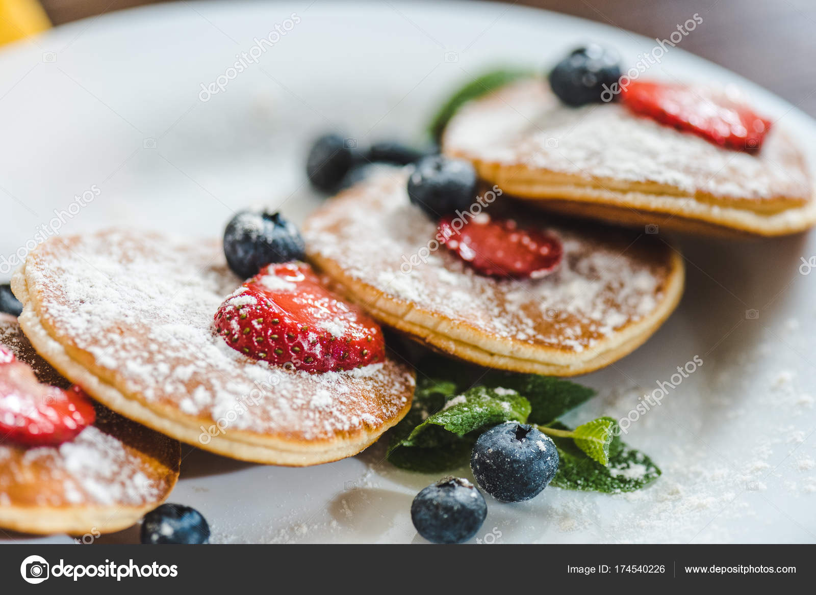 Pancakes — Stock Photo © ArturVerkhovetskiy #174540226