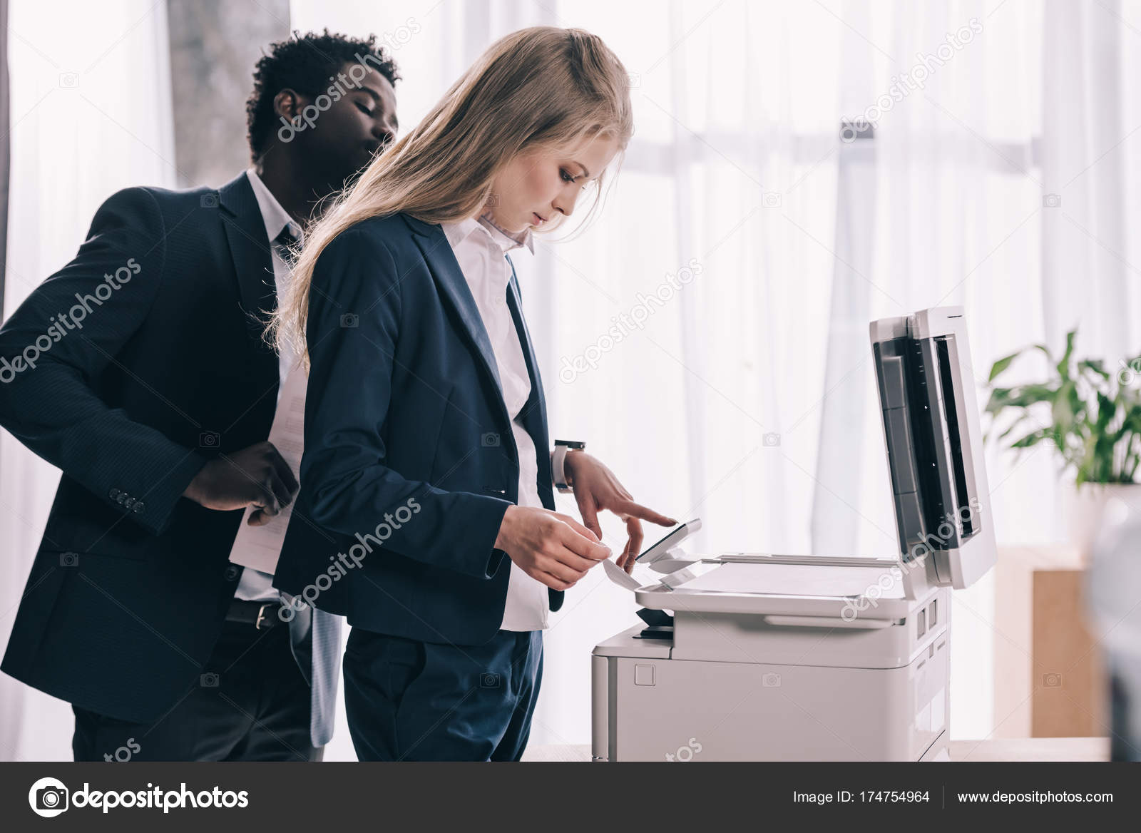 Young Businesspeople Using Copier Together Office — Stock Photo ...