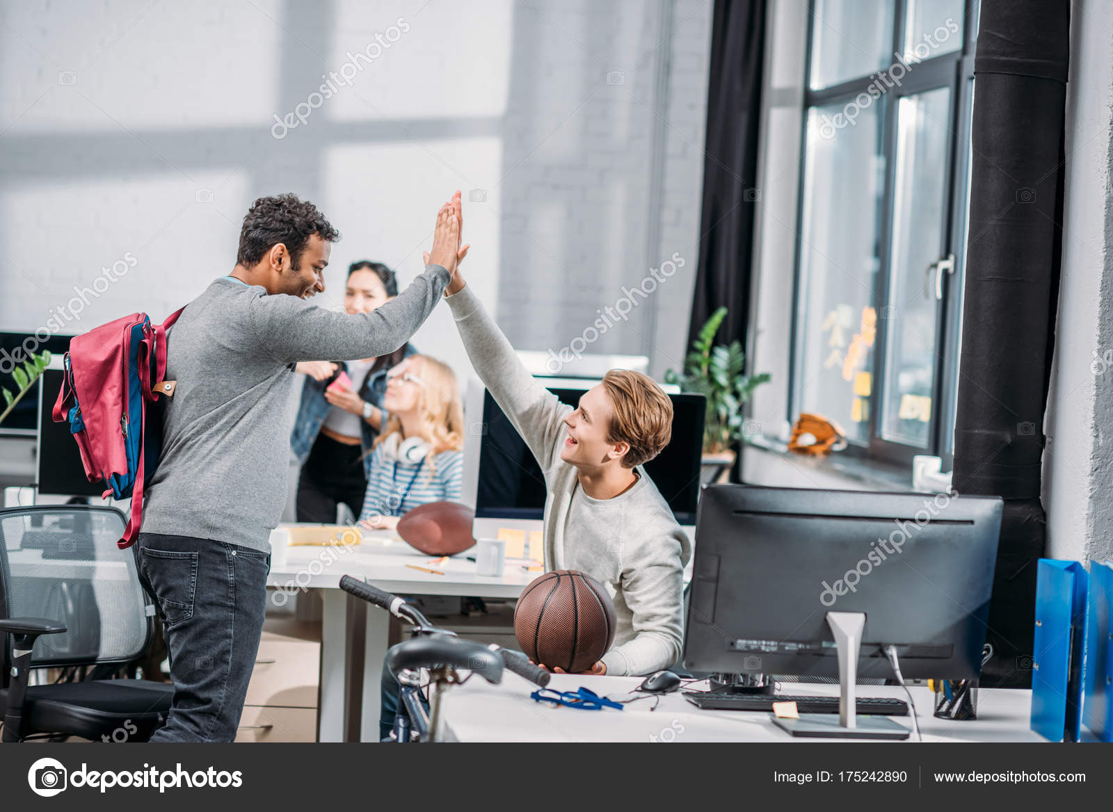 Happy Men Greeting Each Other Modern Office Stock Photo by ...
