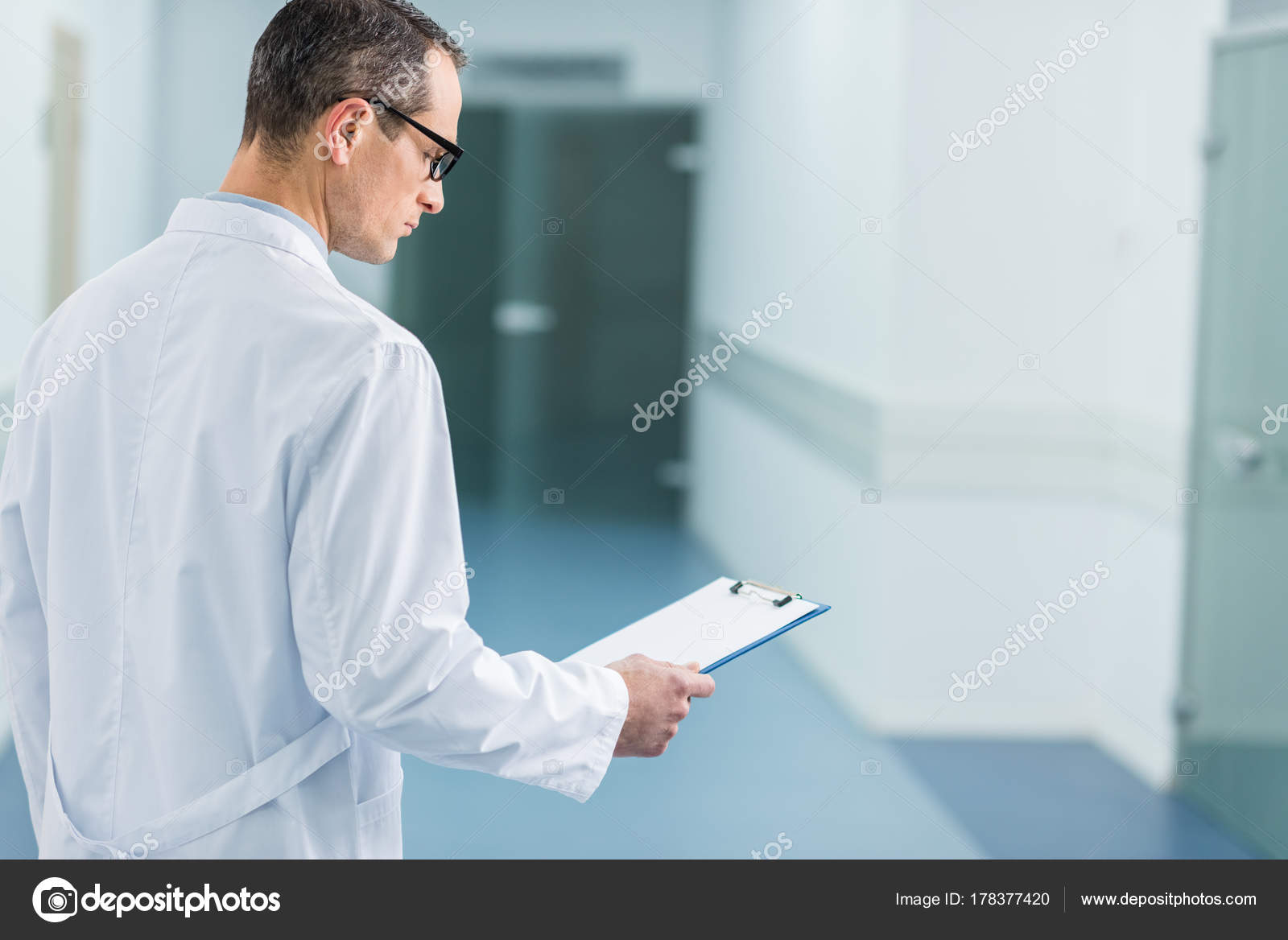 Male Doctor White Coat Reading Diagnosis Hospital — Stock Photo ...