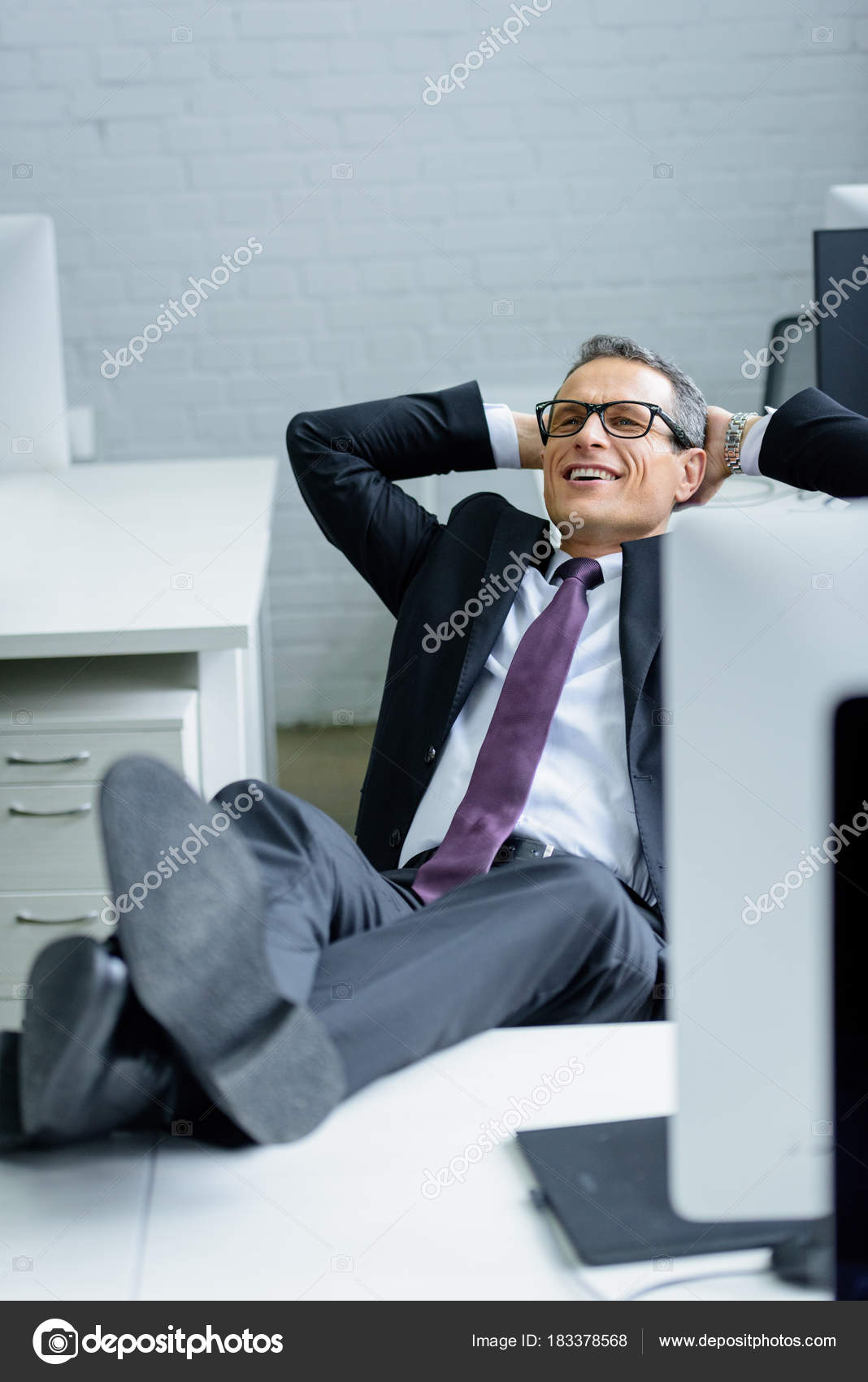 Smiling Businessman Hands Head Resting Workplace — Stock Photo ...