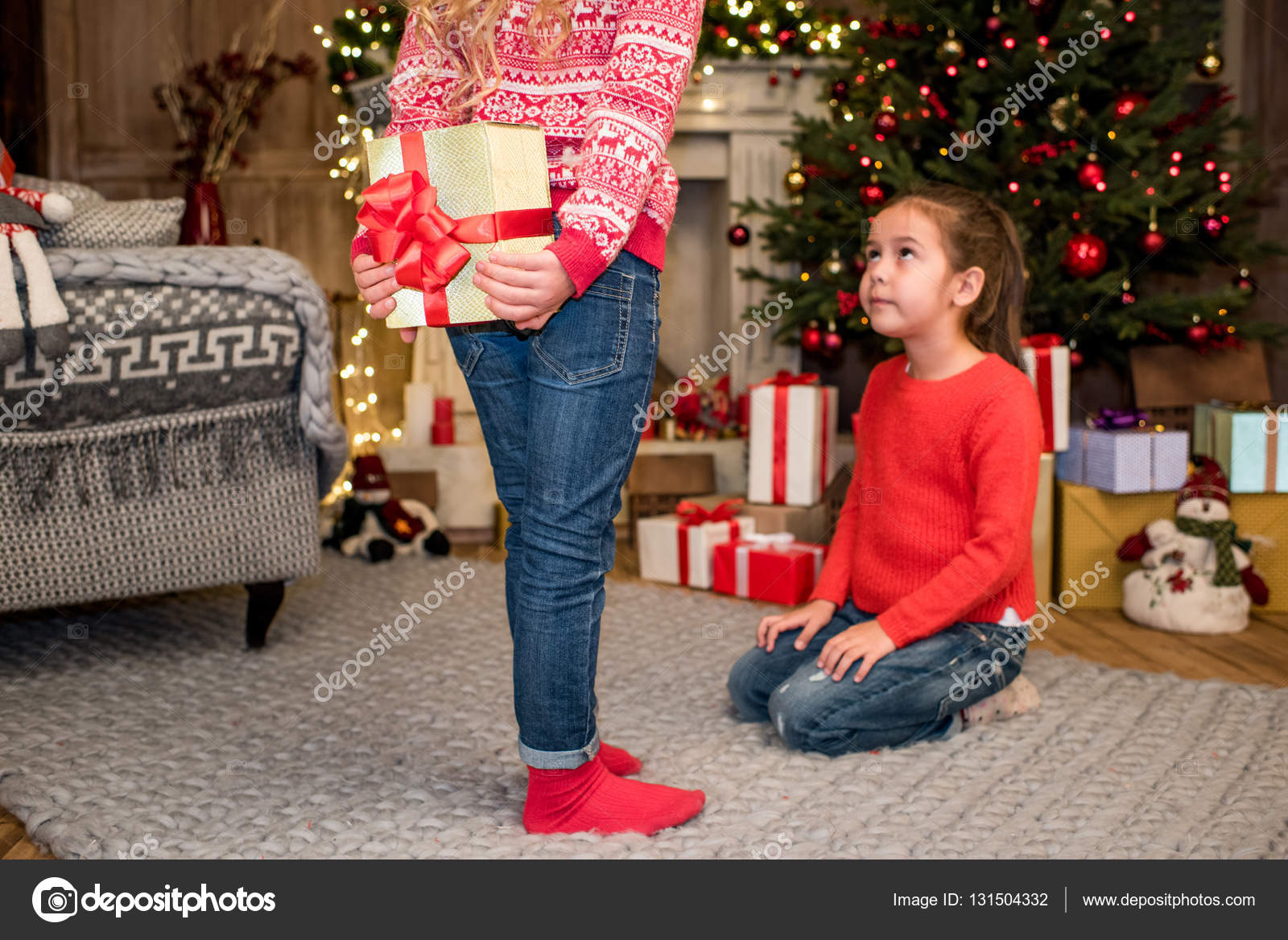 Kid ready to give gift box to friend — Stock Photo © SergKovbasyuk ...