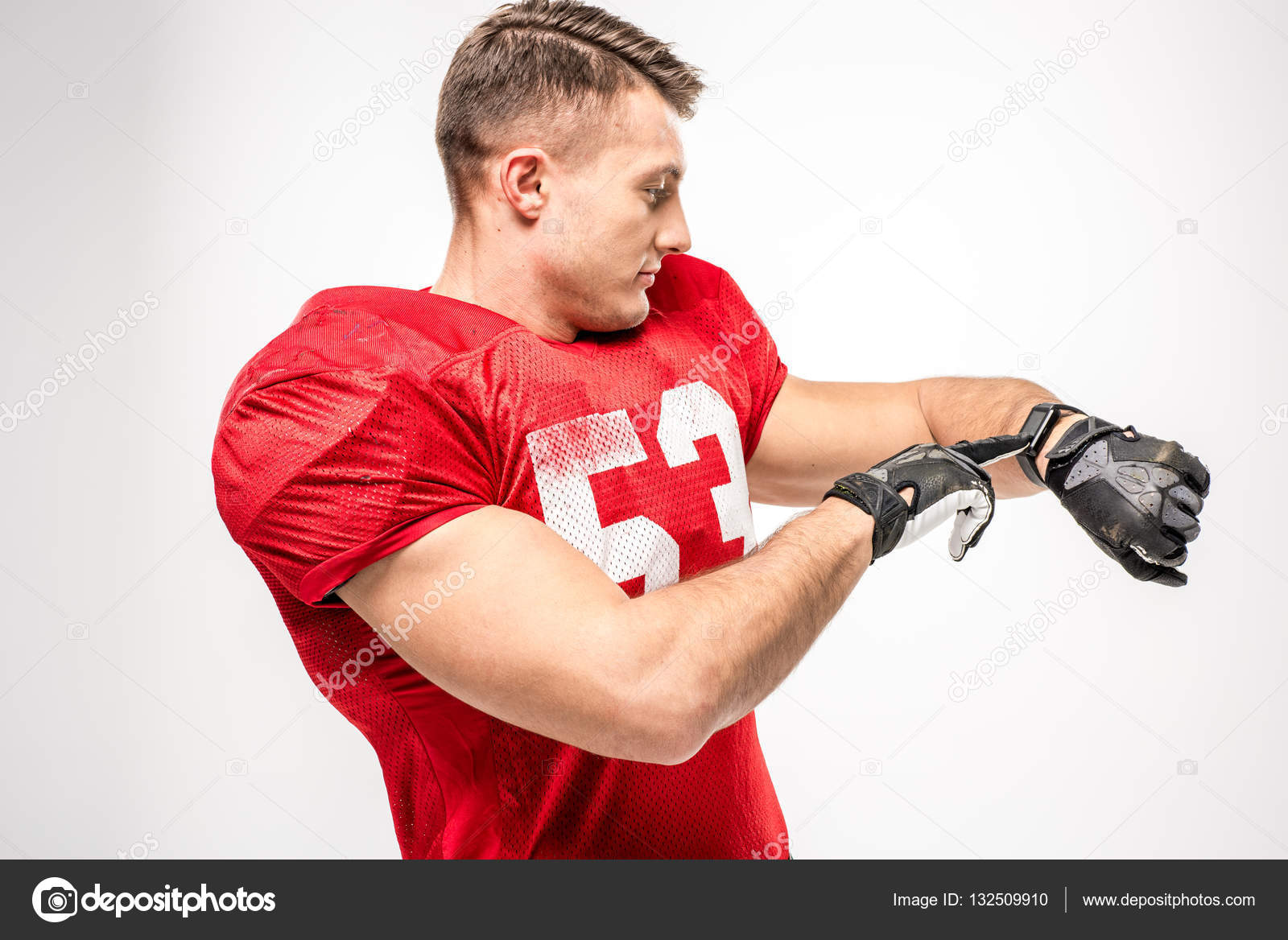 Football player pointing on smartwatch — Stock Photo © DmitryPoch ...